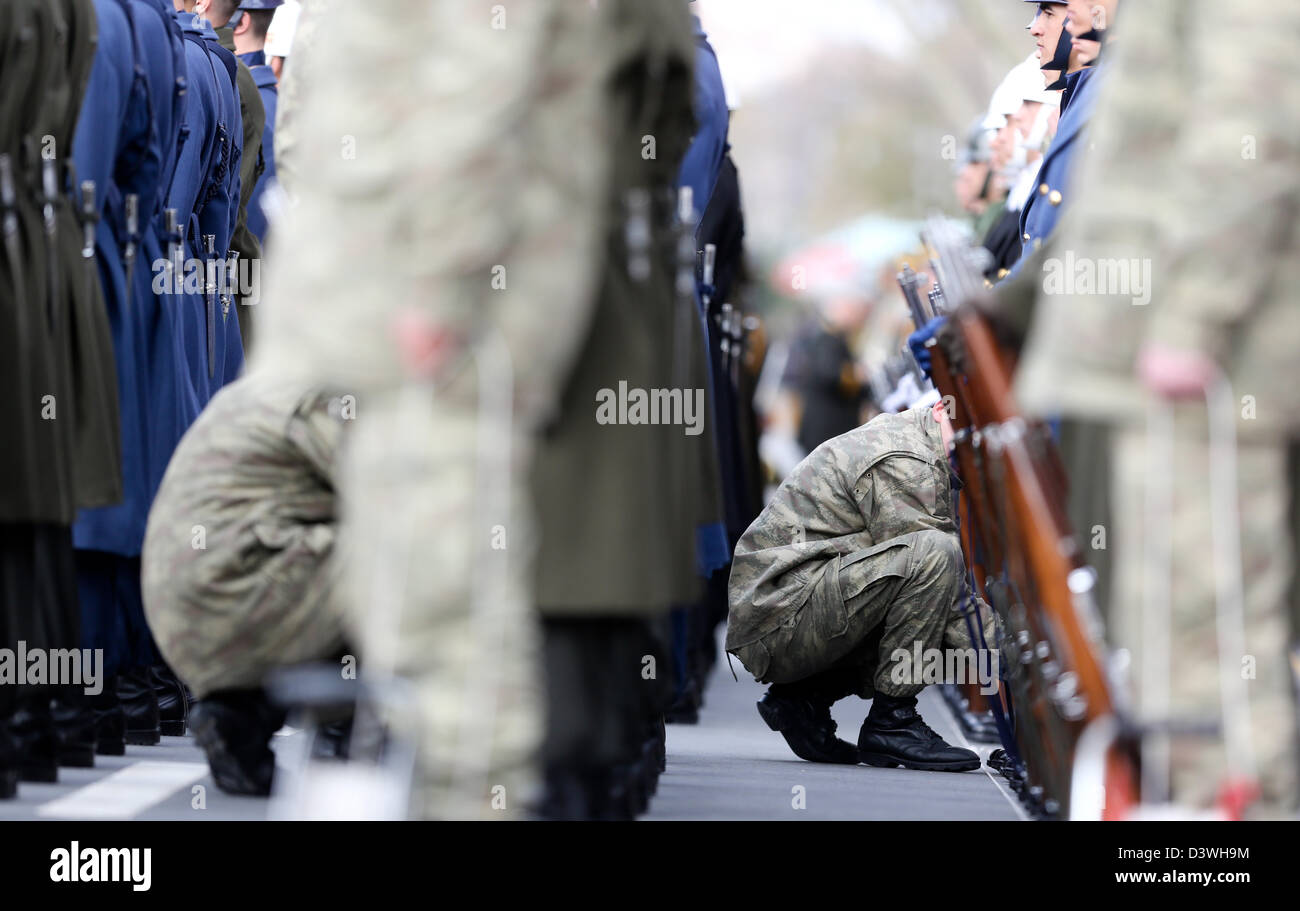 Soliders shoes are polished before the welcoming ceremony for German ...