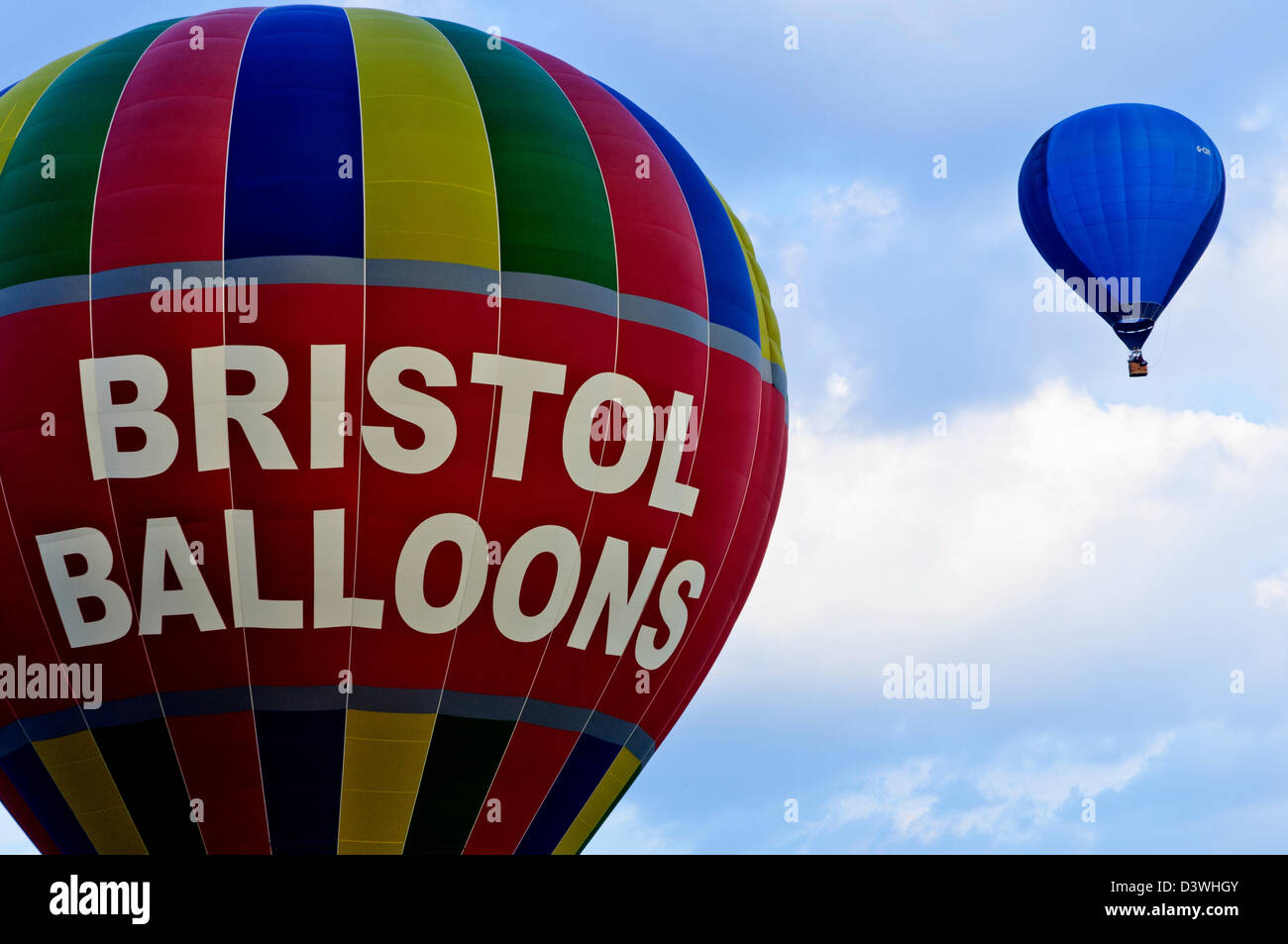 Bristol Balloons hot air balloon with sky and a blue hot air balloon in ...