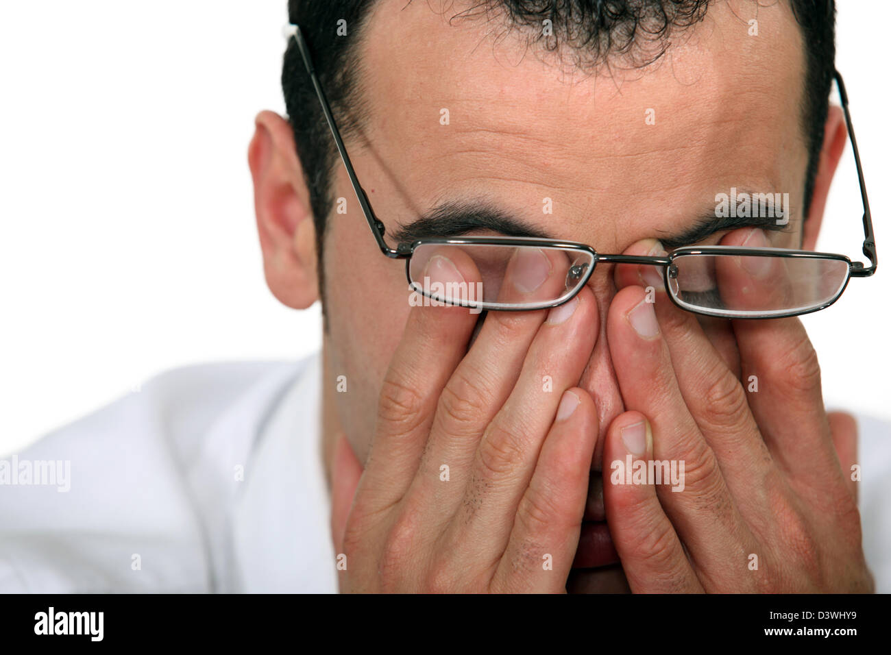Stressed man rubbing face eyes hi-res stock photography and images - Alamy