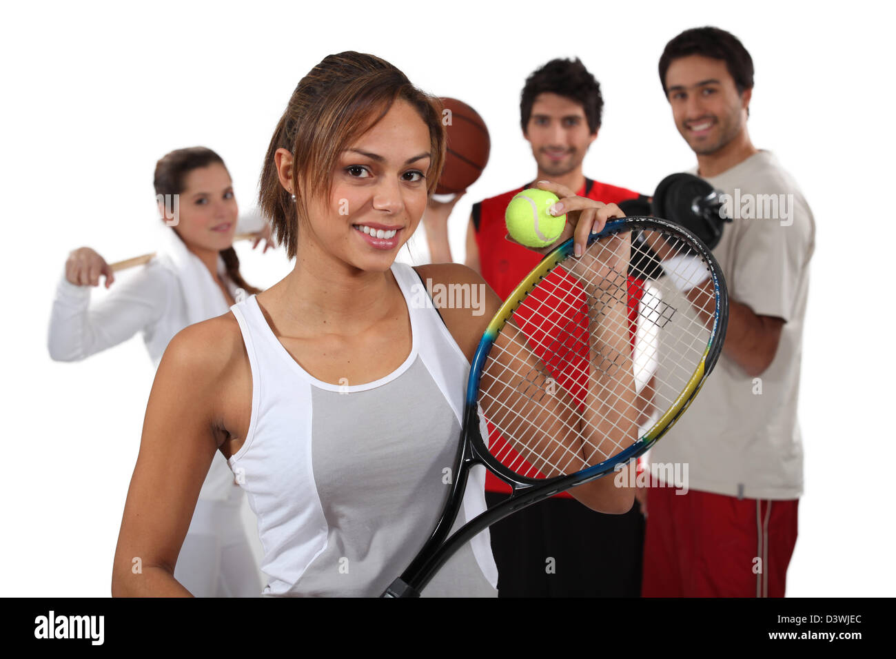 Teenagers dressed for different sports Stock Photo - Alamy
