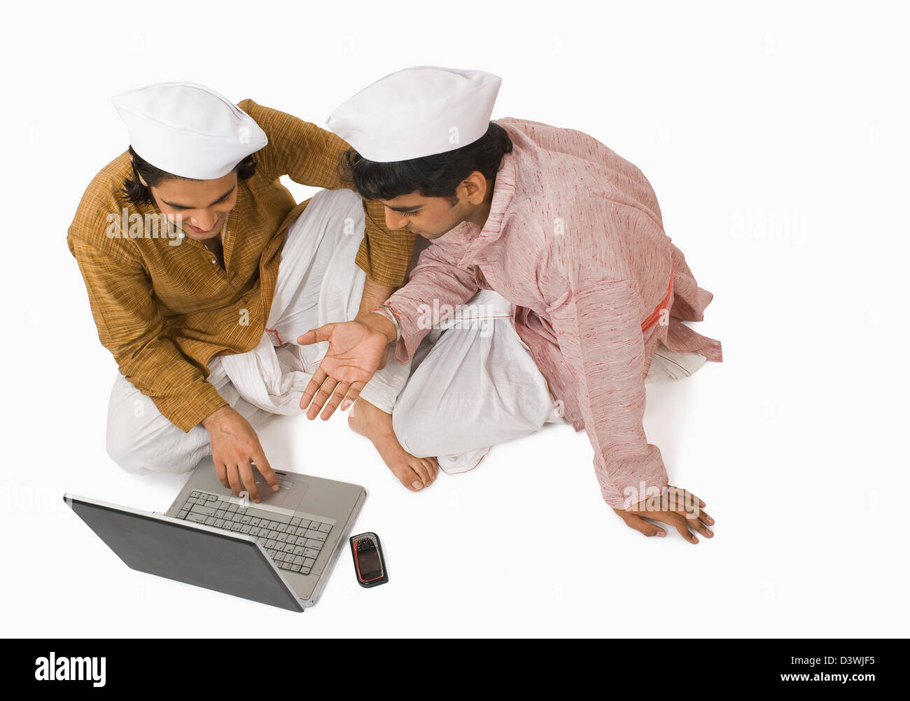 Barefoot laptop man Cut Out Stock Images & Pictures - Alamy