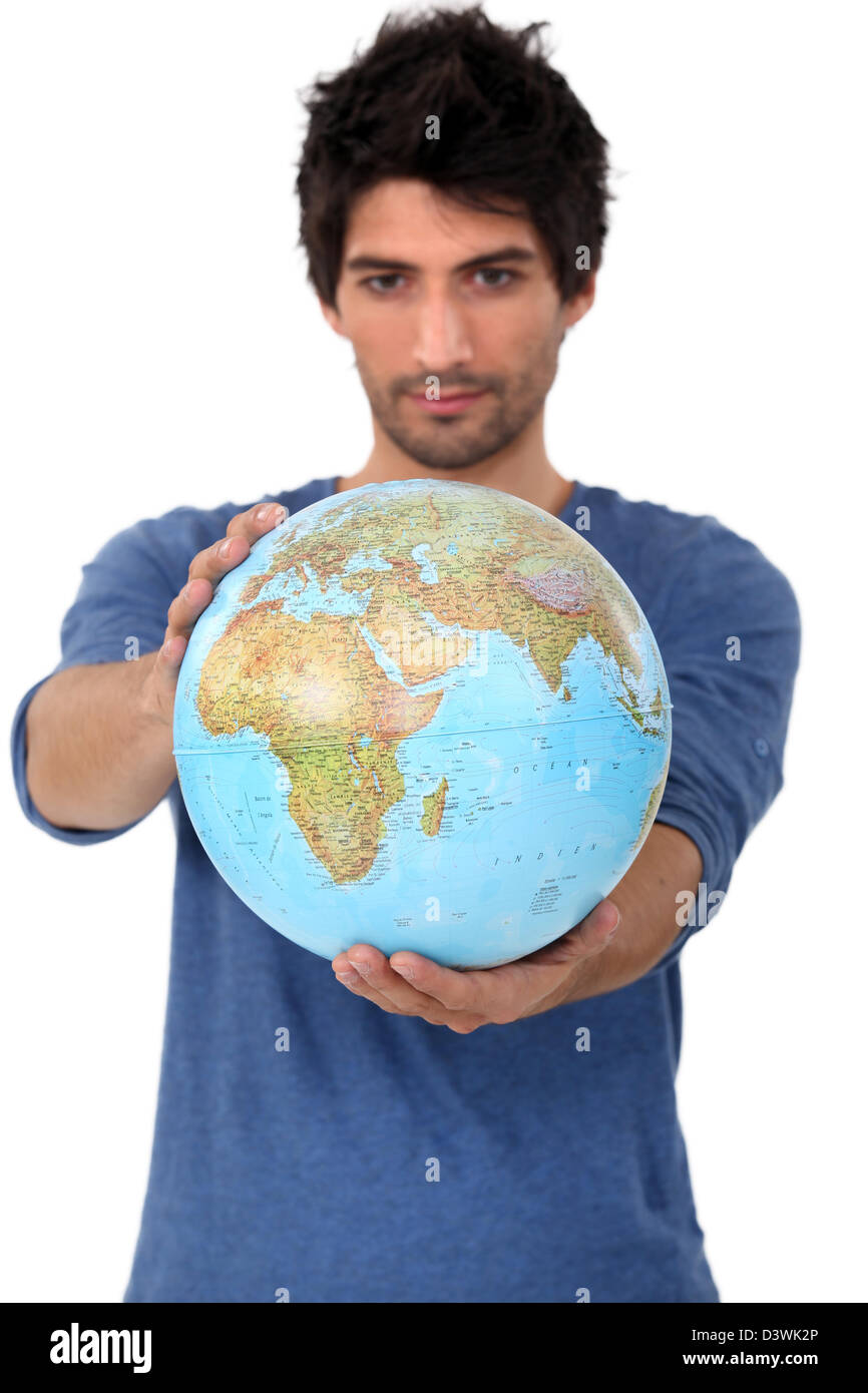 Business man holding atlas globe hi-res stock photography and images ...