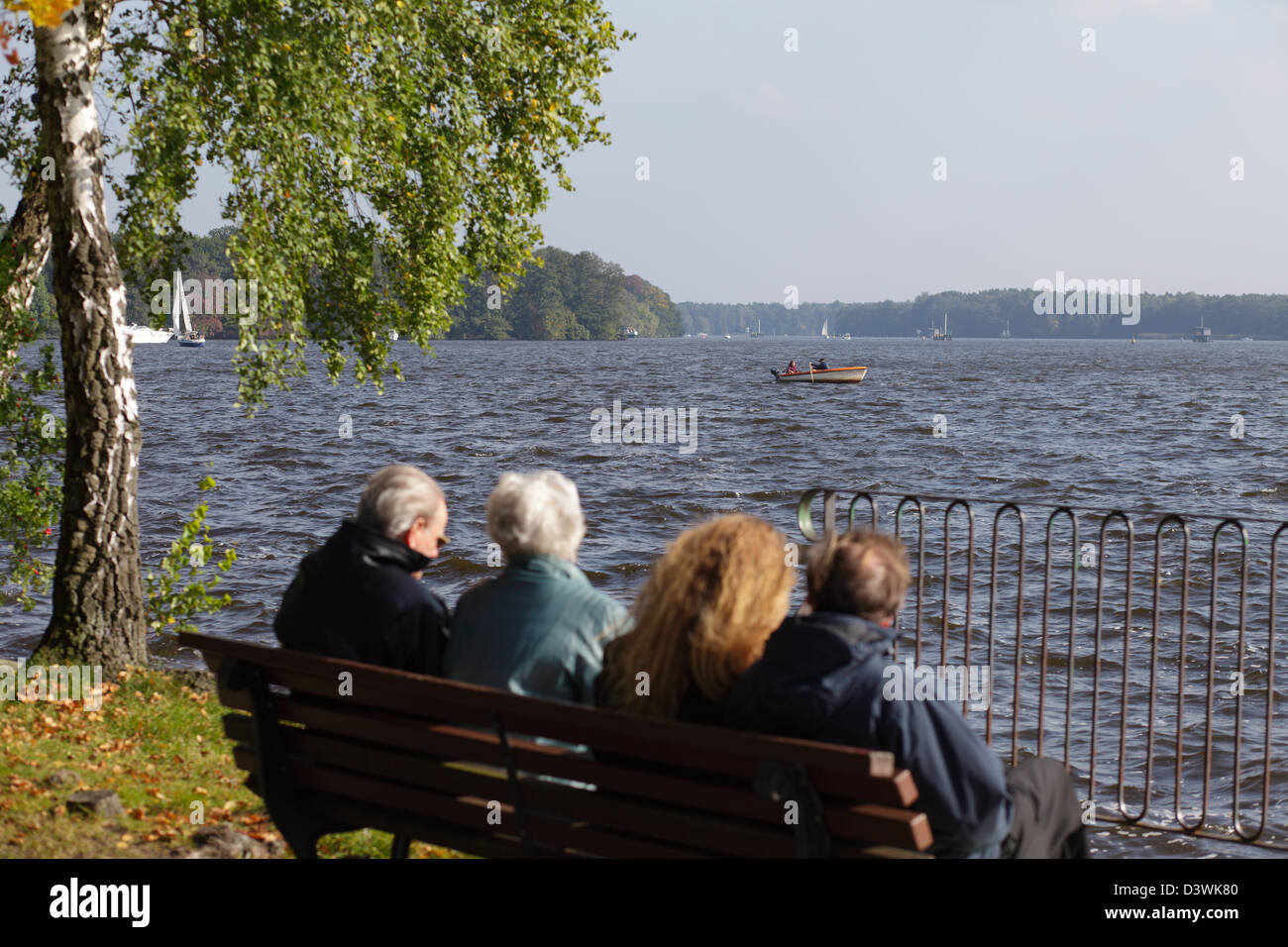 Berlin, Germany, visitors sit on a park bench on Long Lake Stock Photo ...