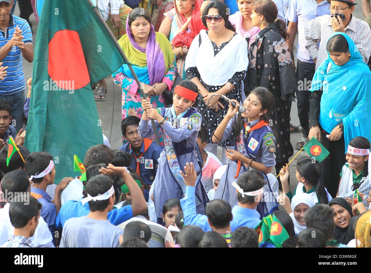 Dhaka, Bangladesh. 25th Feb, 2013. School students hold national flags ...