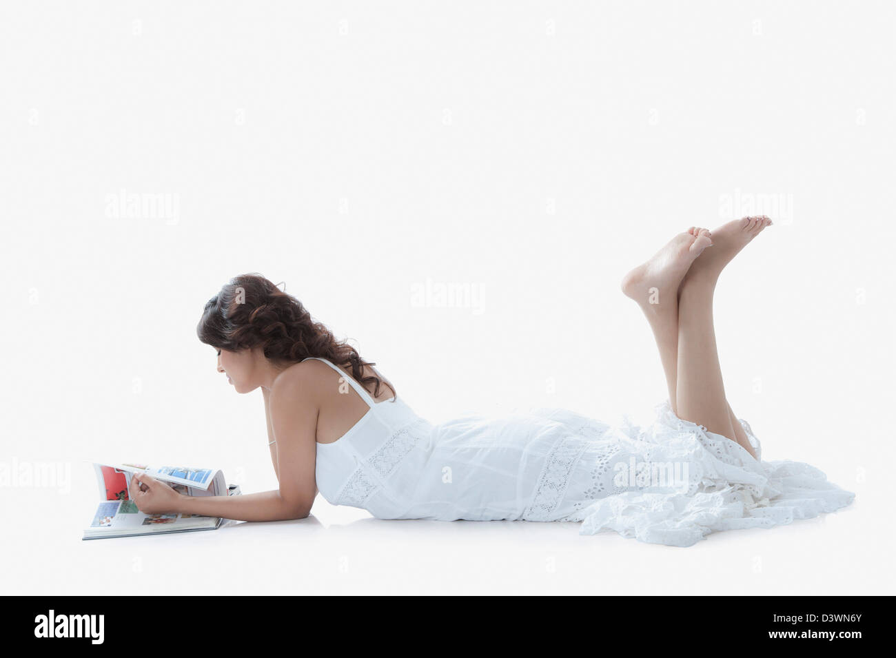 Woman reading black dress Cut Out Stock Images & Pictures - Alamy