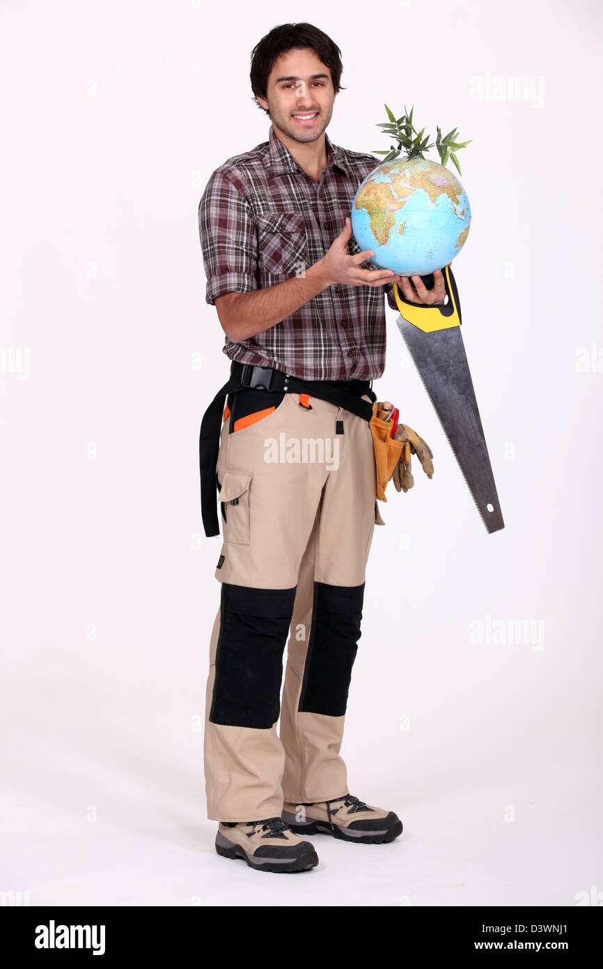 Craftsman with globe in hand Stock Photo - Alamy