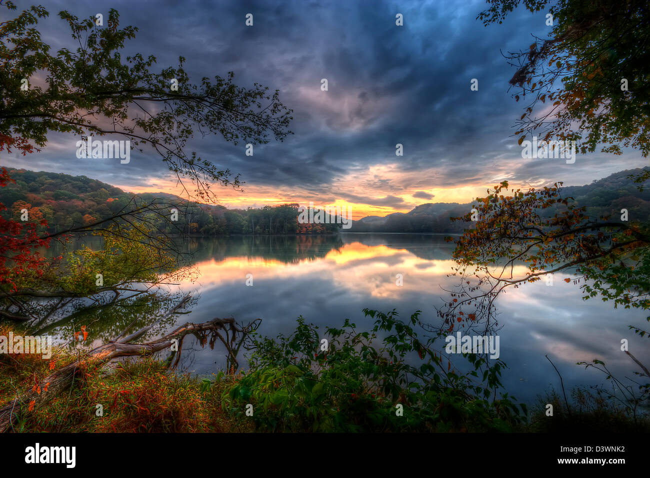 A beautiful sunrise over a lake Stock Photo - Alamy