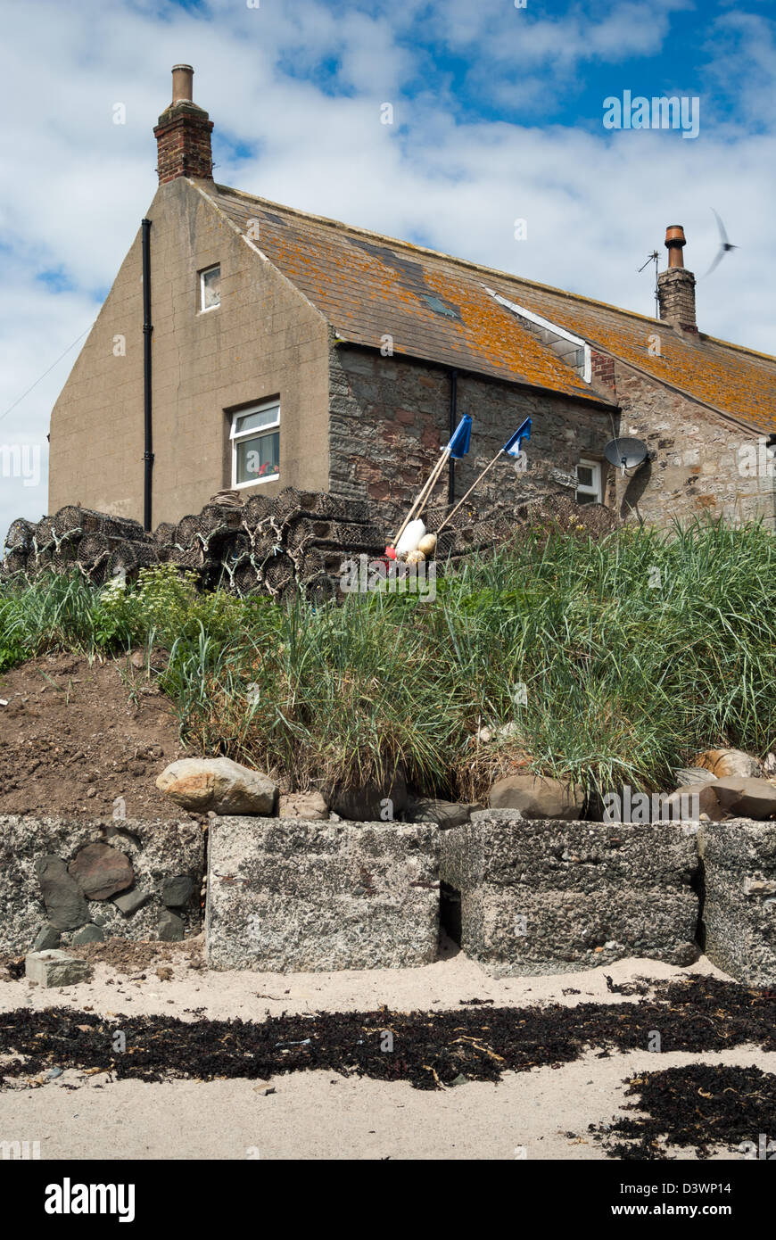 Houses on the foreshore. Bulmer Northumberland England UK Stock Photo ...