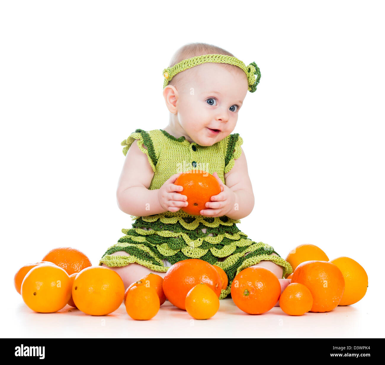 Child eating orange fruit hi-res stock photography and images - Alamy