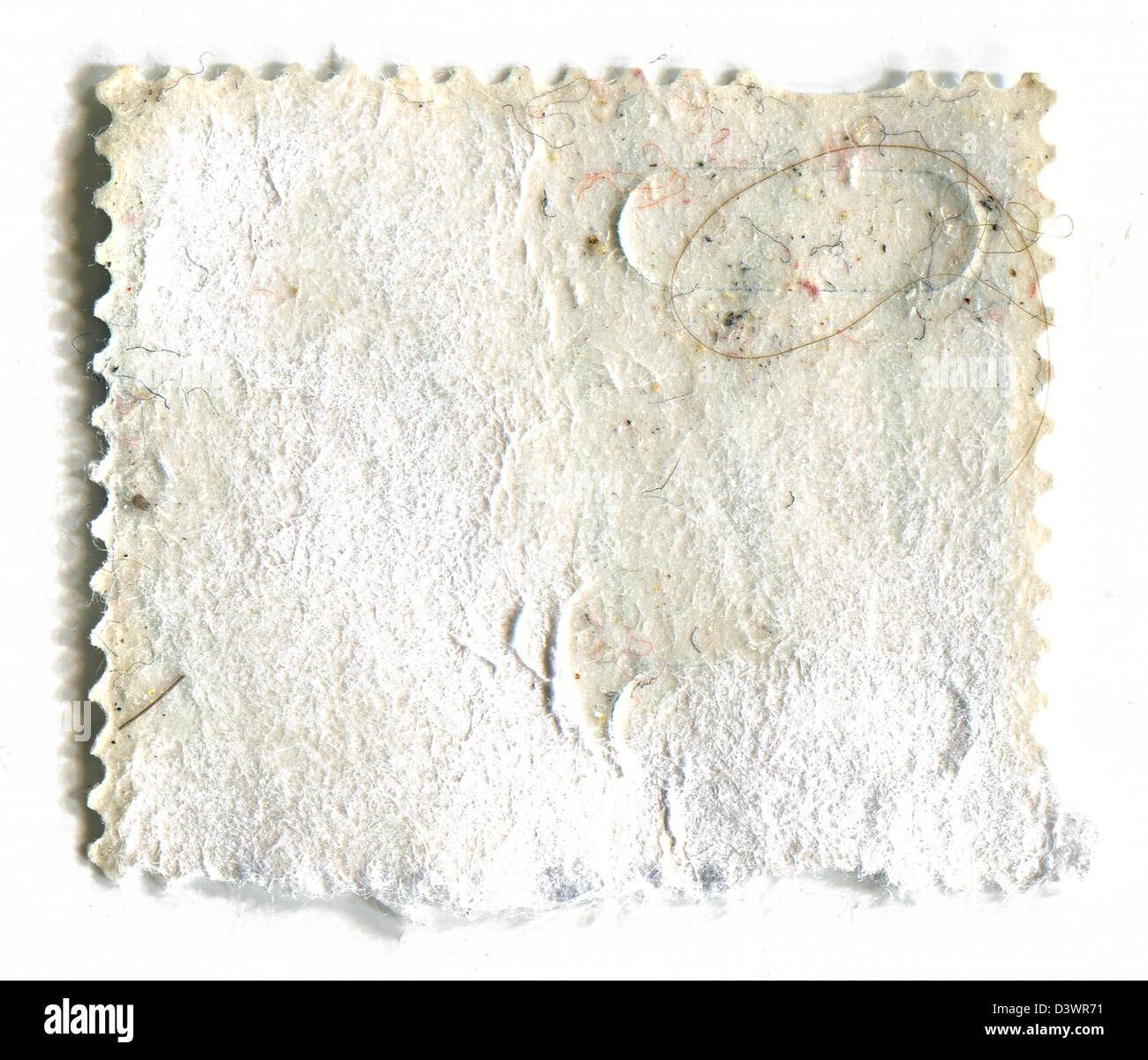 The reverse side of a postage stamp Stock Photo - Alamy