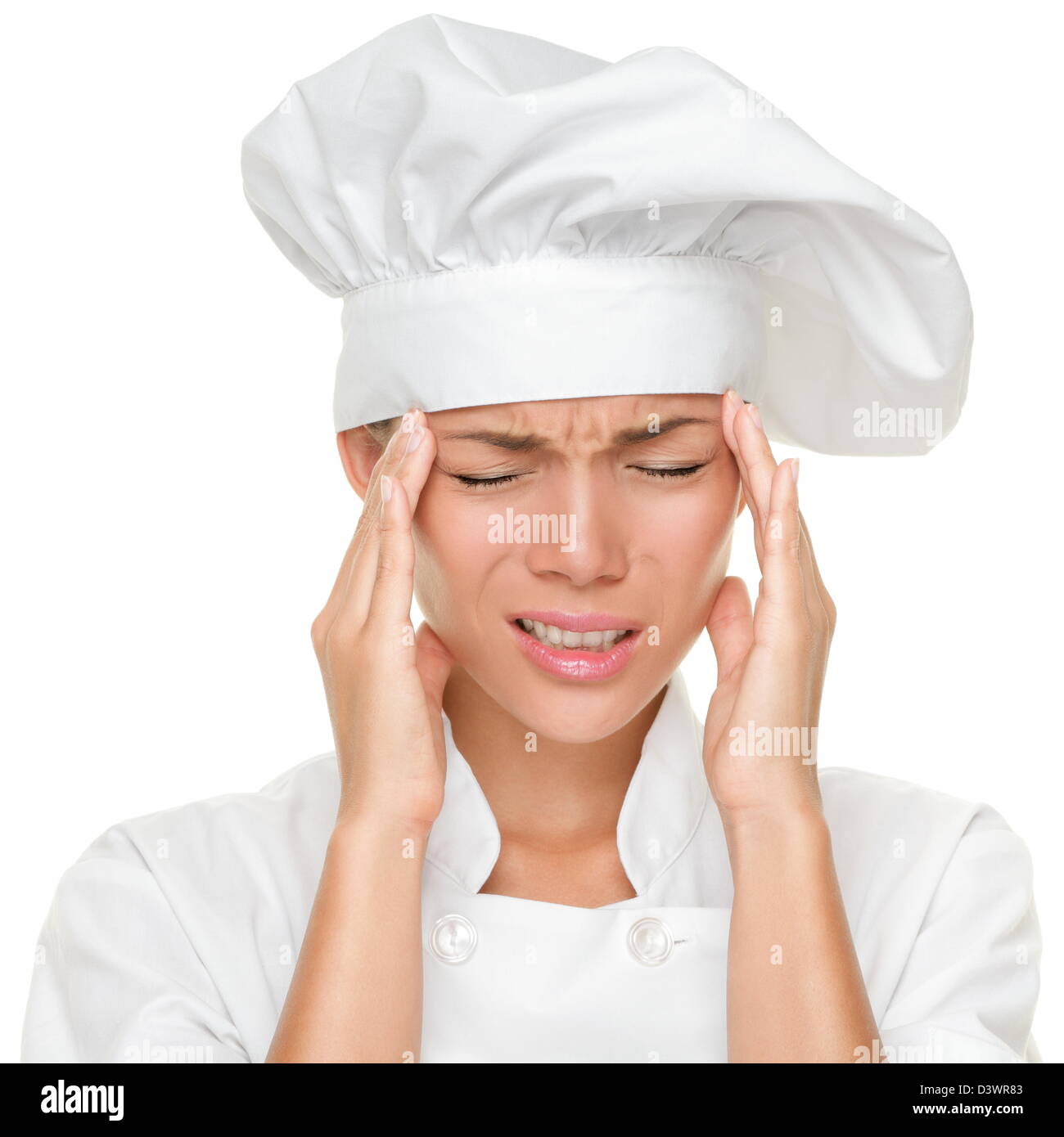 Closeup of Asian Caucasian female chef feeling tired stressed and ...