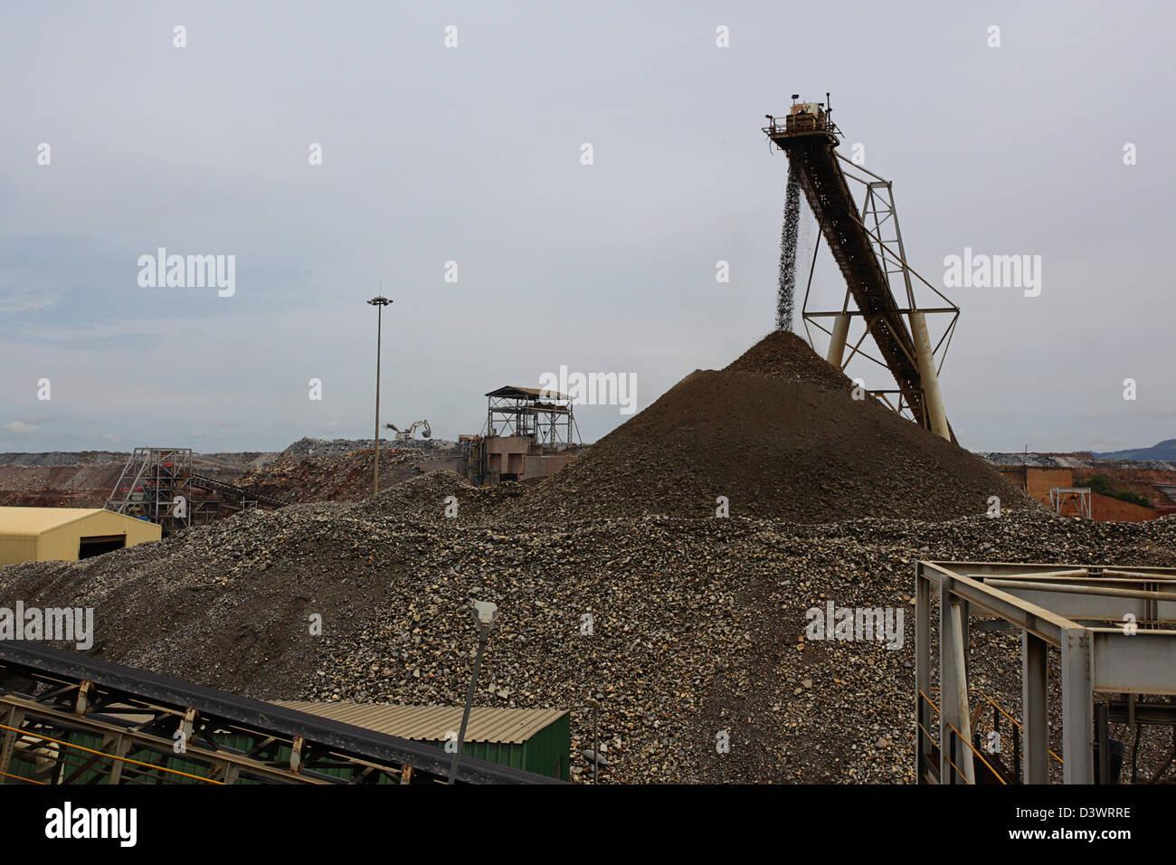 Copper ore pouring off a conveyor belt at FQM Kansanshi mine (landscape ...