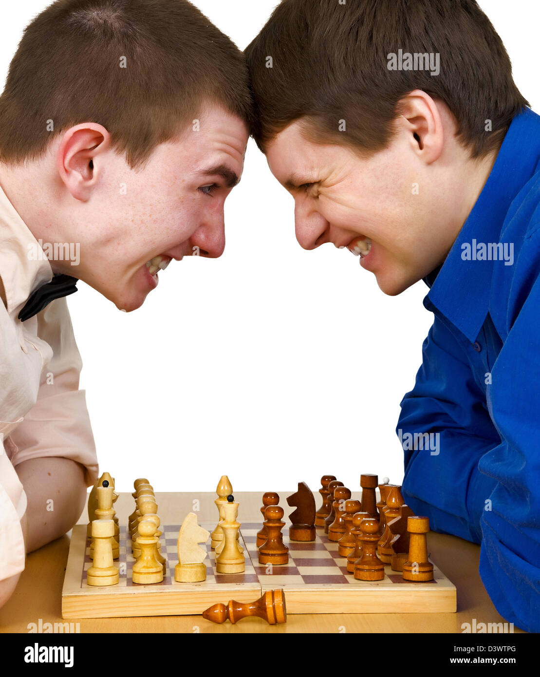 Two aggressive chess opponents fights with his forehead under chess ...