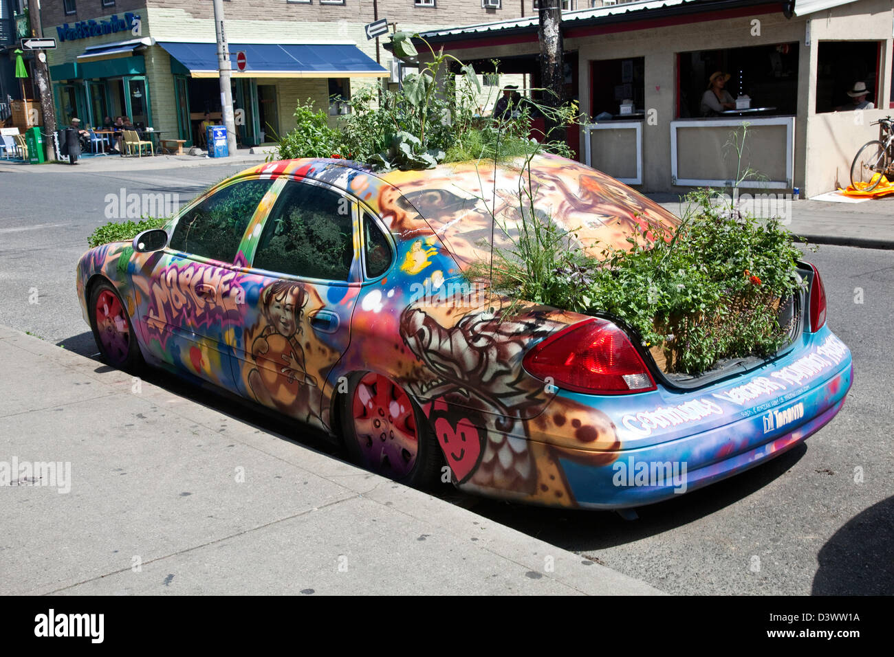 Colorful painted vegetable car at Canada;Ontario;Toronto;Kensington ...