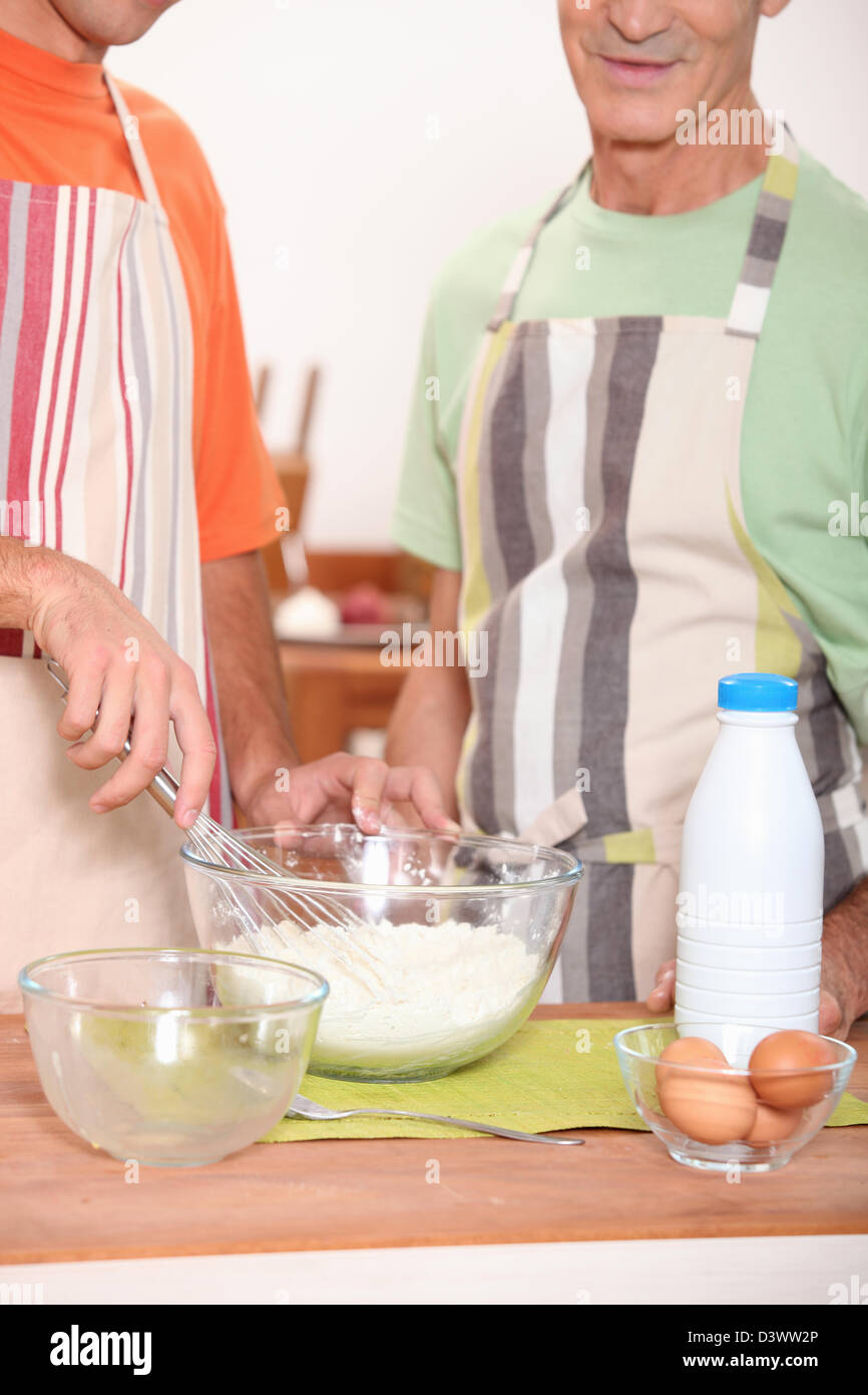 Two men baking Stock Photo - Alamy