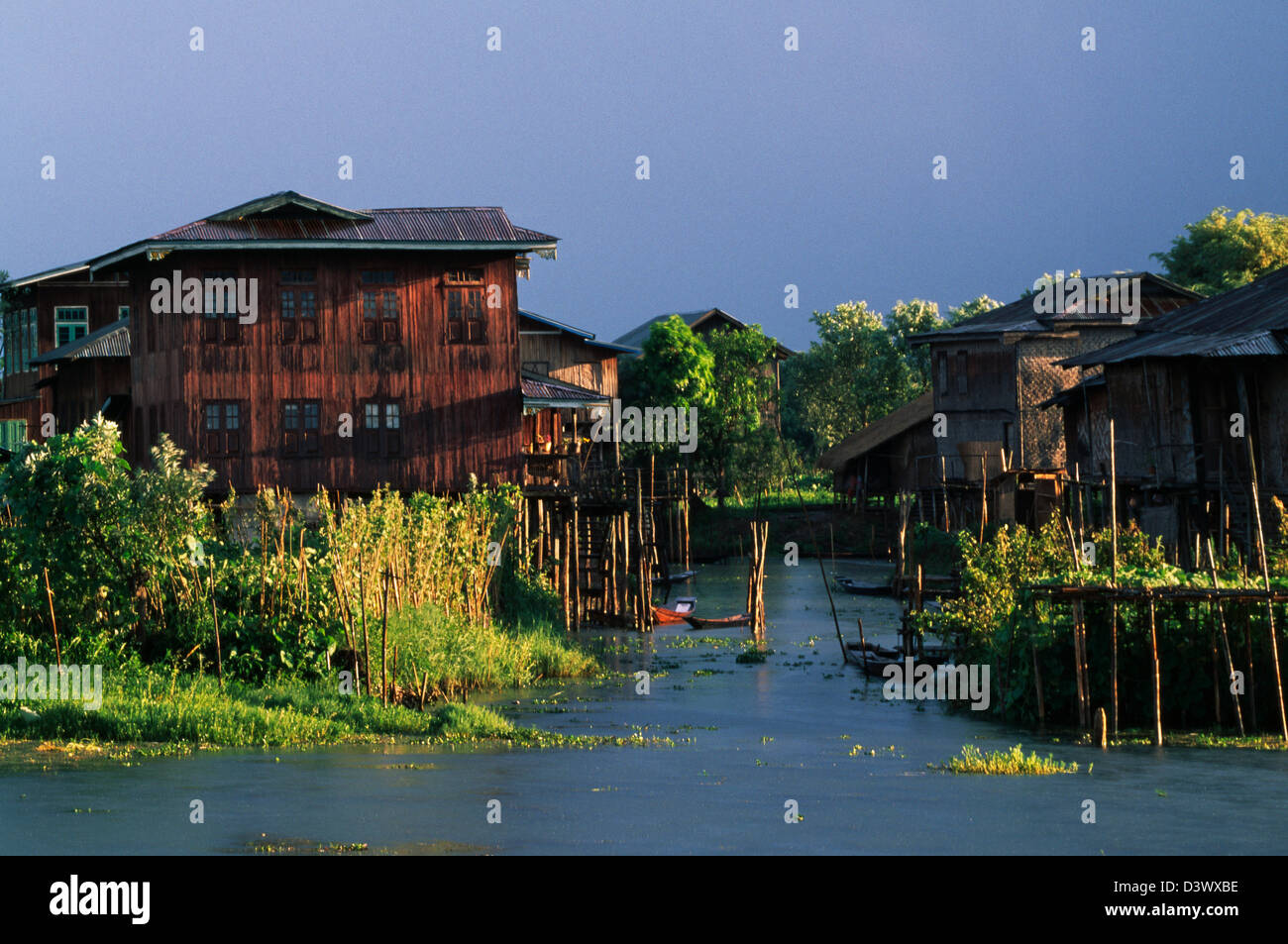 A floating village with stilt houses on the water, Inle Lake, Myanmar ...