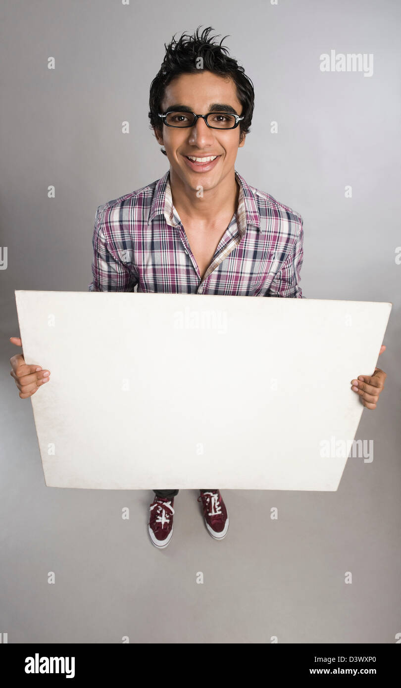 Man standing with a placard Stock Photo - Alamy