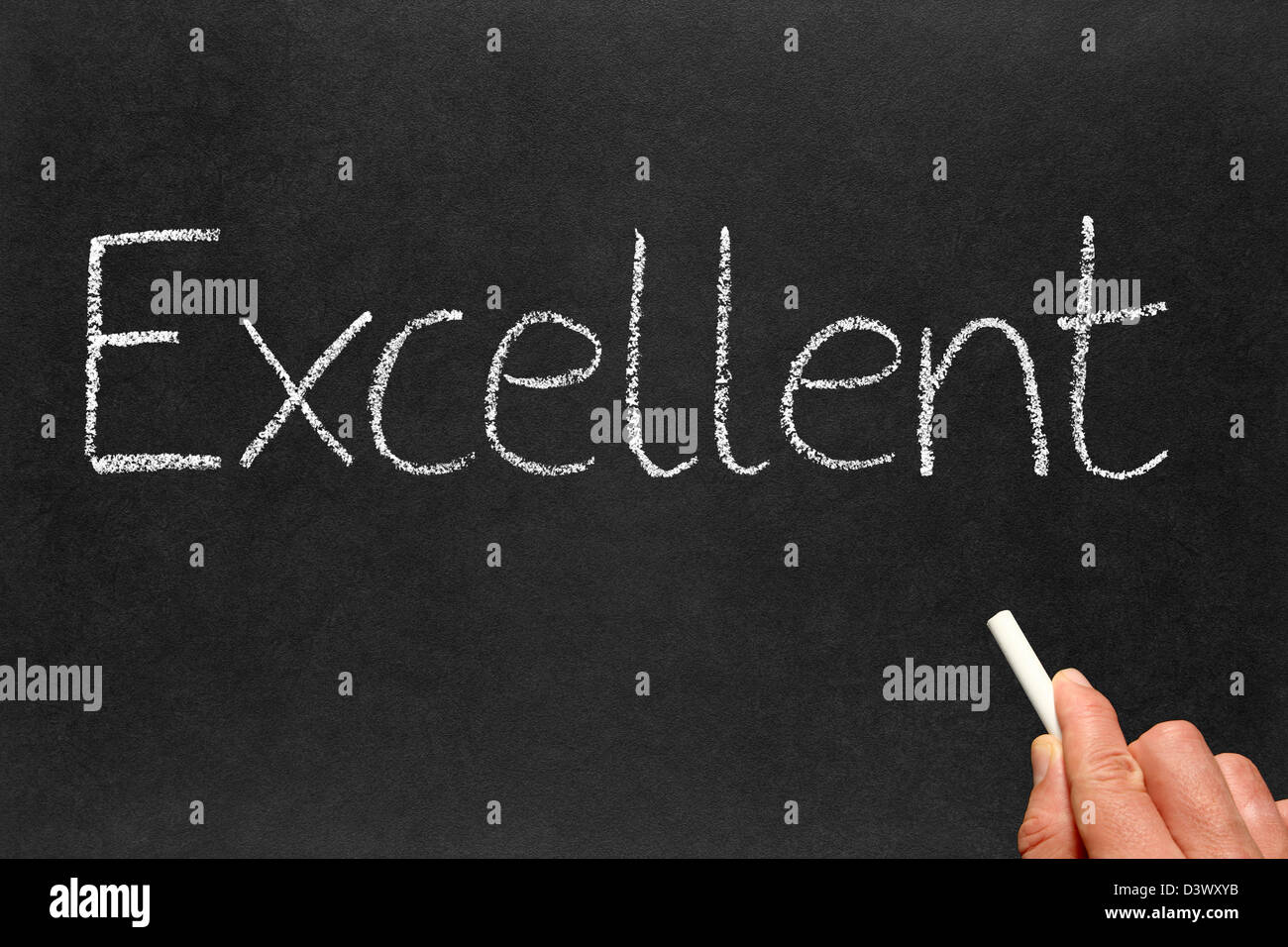 Writing excellent on a blackboard Stock Photo - Alamy