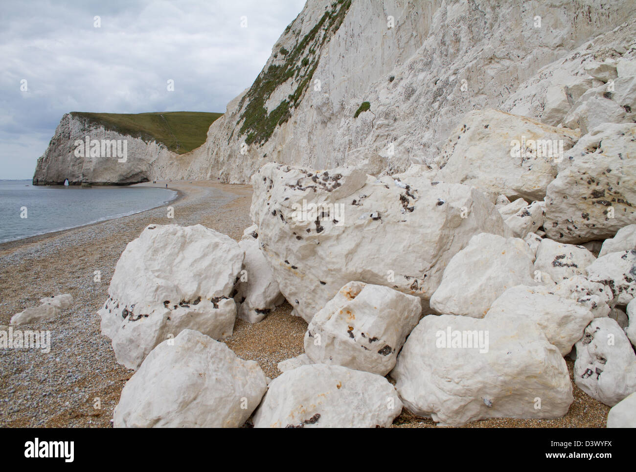 Rockfall from chalk cliffs at Durdle Door on England's Jurassic Coast ...