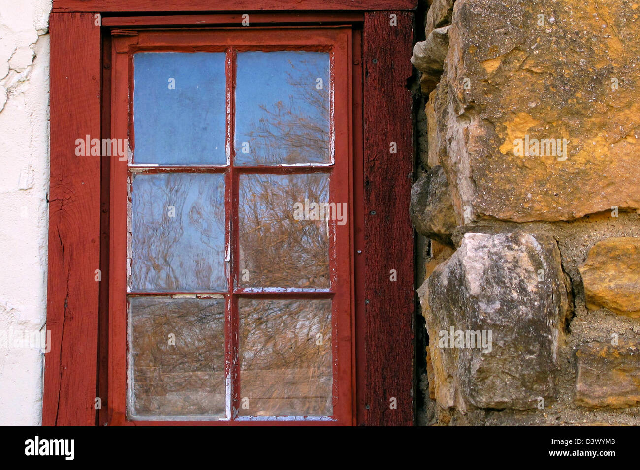 Window in stone wall Stock Photo - Alamy