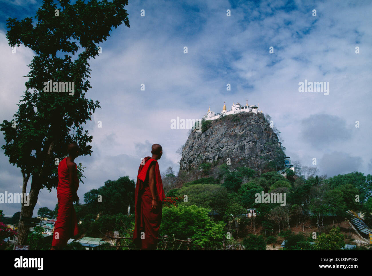 Two monks with Mt. Popa, Bagan, Myanmar Stock Photo - Alamy