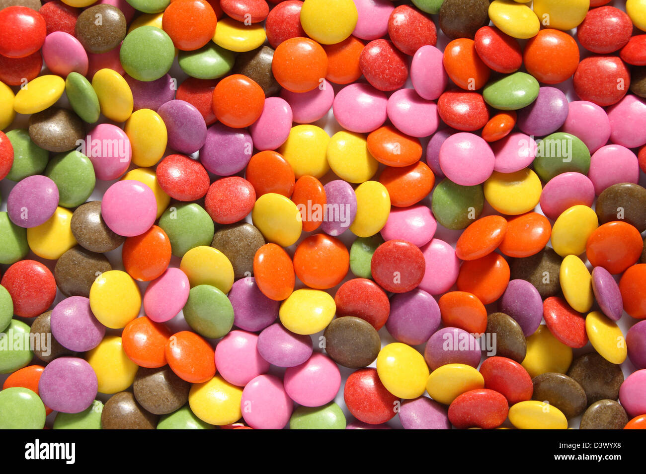 Lots of colourful smarties Stock Photo - Alamy
