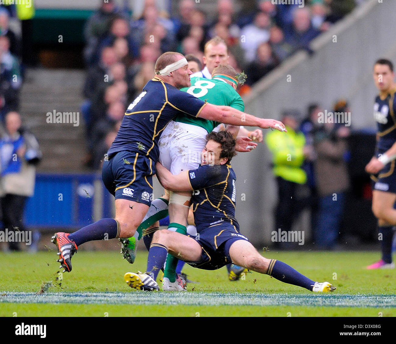Edinburgh, UK. 24th February 2013. Jamie Heaslip of Ireland tackled by ...