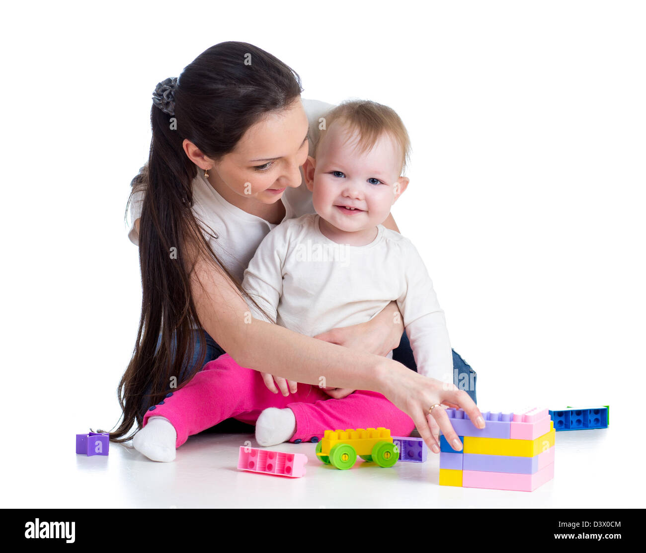 baby girl and mother playing together with toy Stock Photo - Alamy