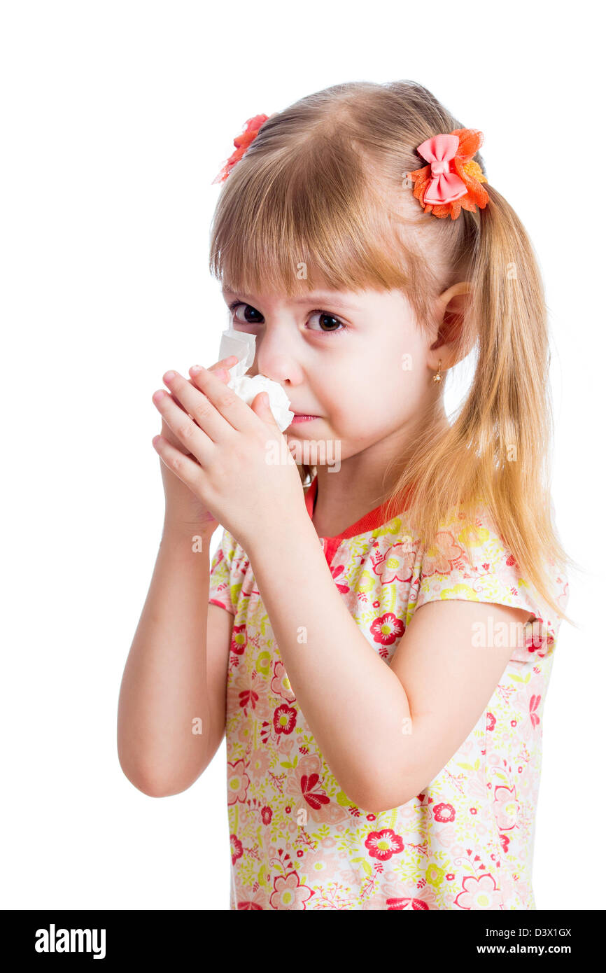 kid cleaning nose with tissue isolated on white Stock Photo - Alamy