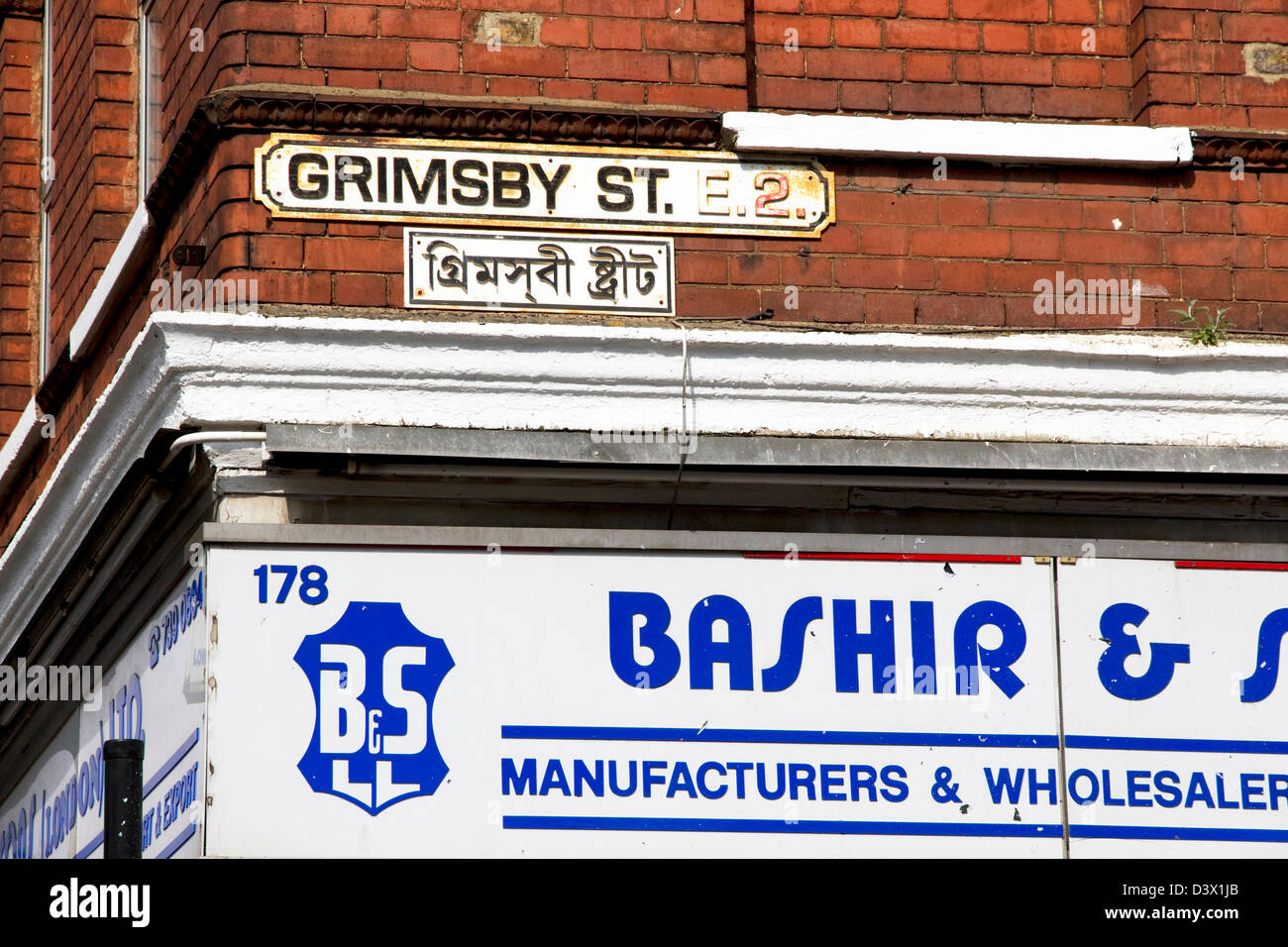 Street signs in English and Bengali, corner of Brick Lane/ Grimsby St ...