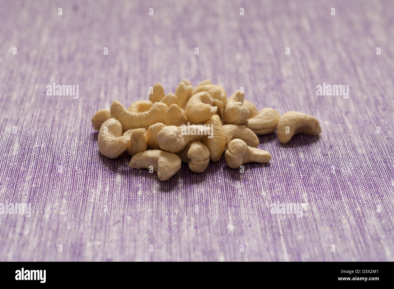 Close-up view of organic Cashew Nuts on a stone plate Stock Photo - Alamy