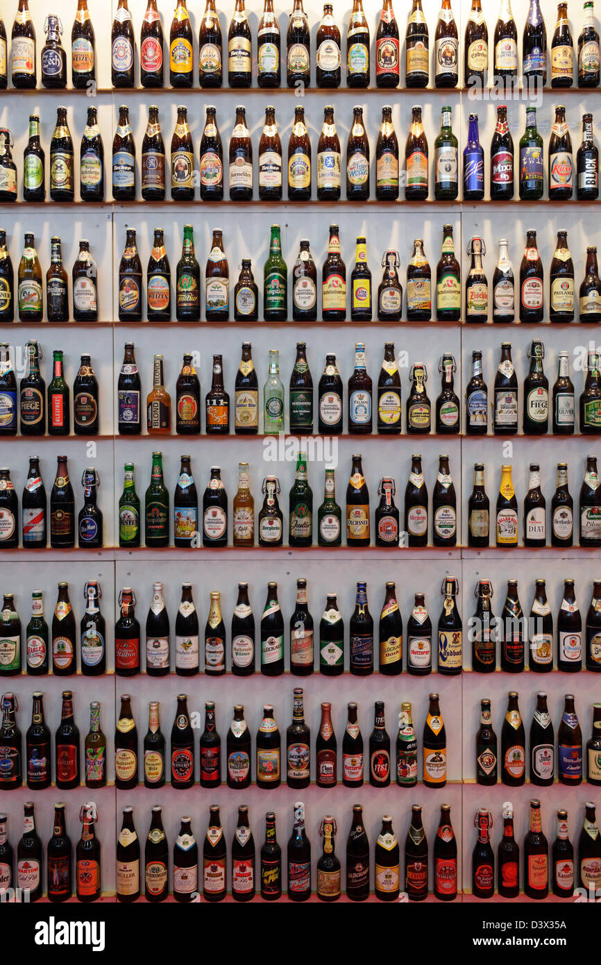 Berlin, Germany, a wall with beer bottles from all over Germany, Green ...
