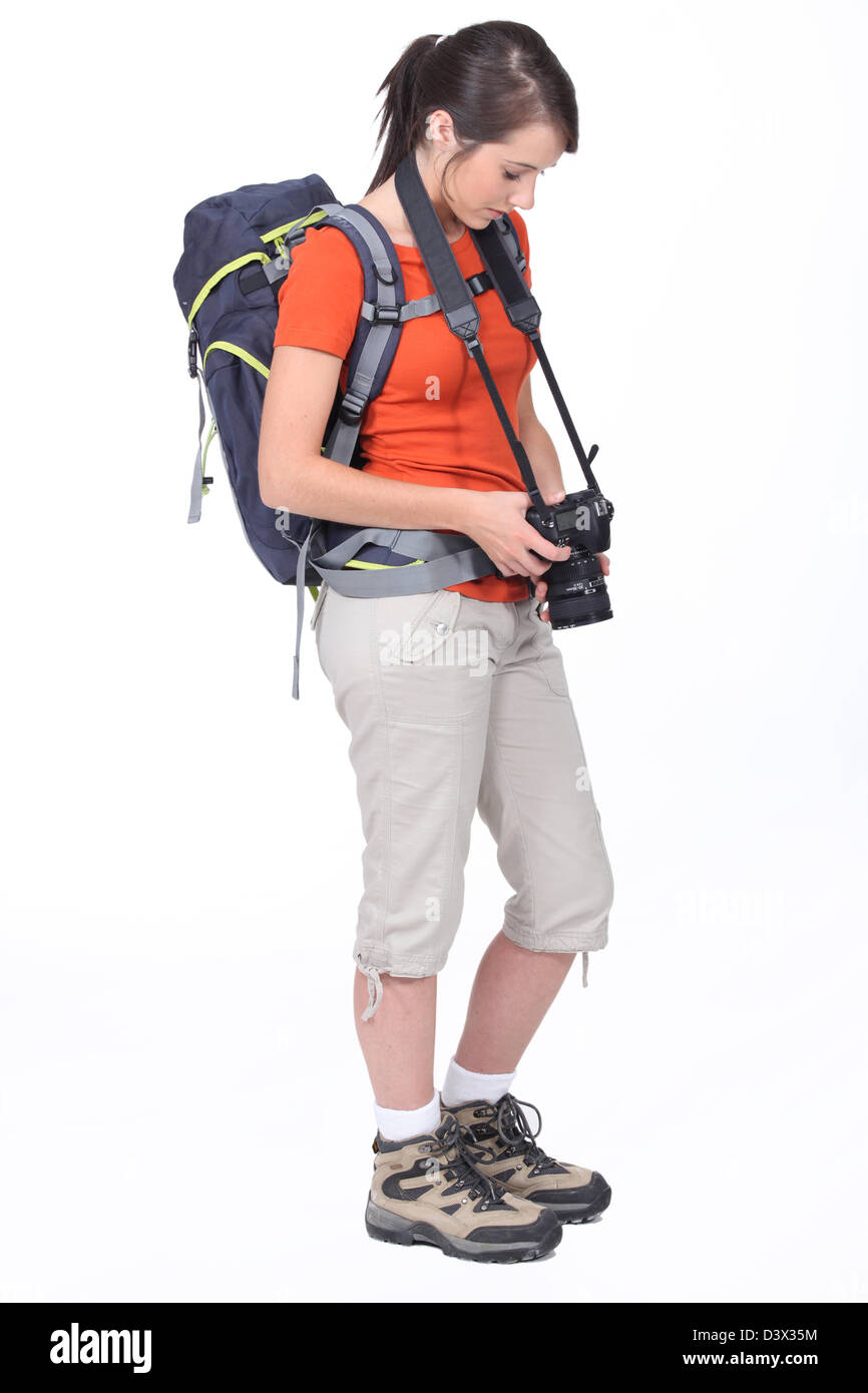 cute female hiker with camera isolated on white Stock Photo - Alamy