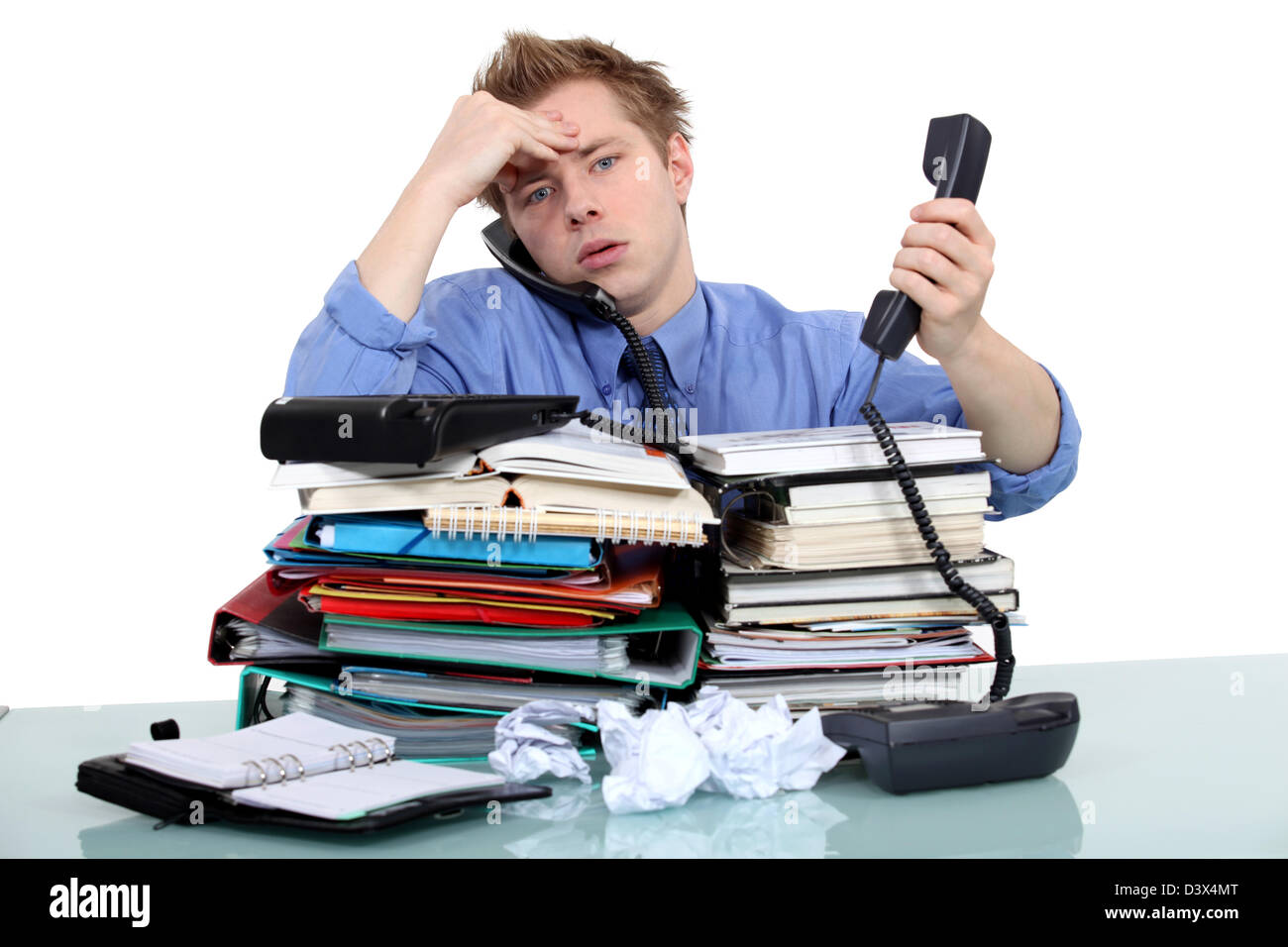 An overwhelmed businessman Stock Photo - Alamy