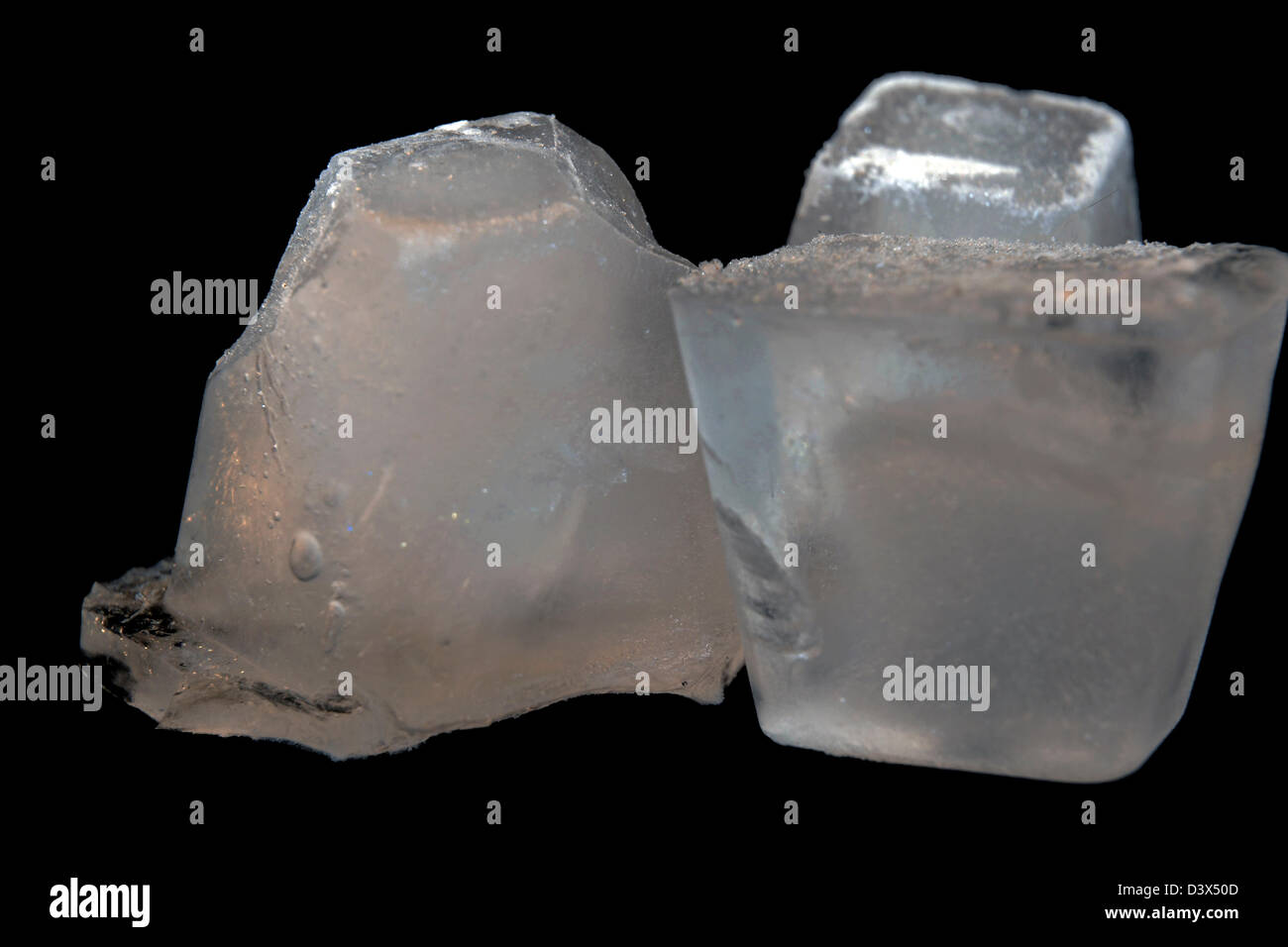 three ice cubes white opaque Stock Photo - Alamy