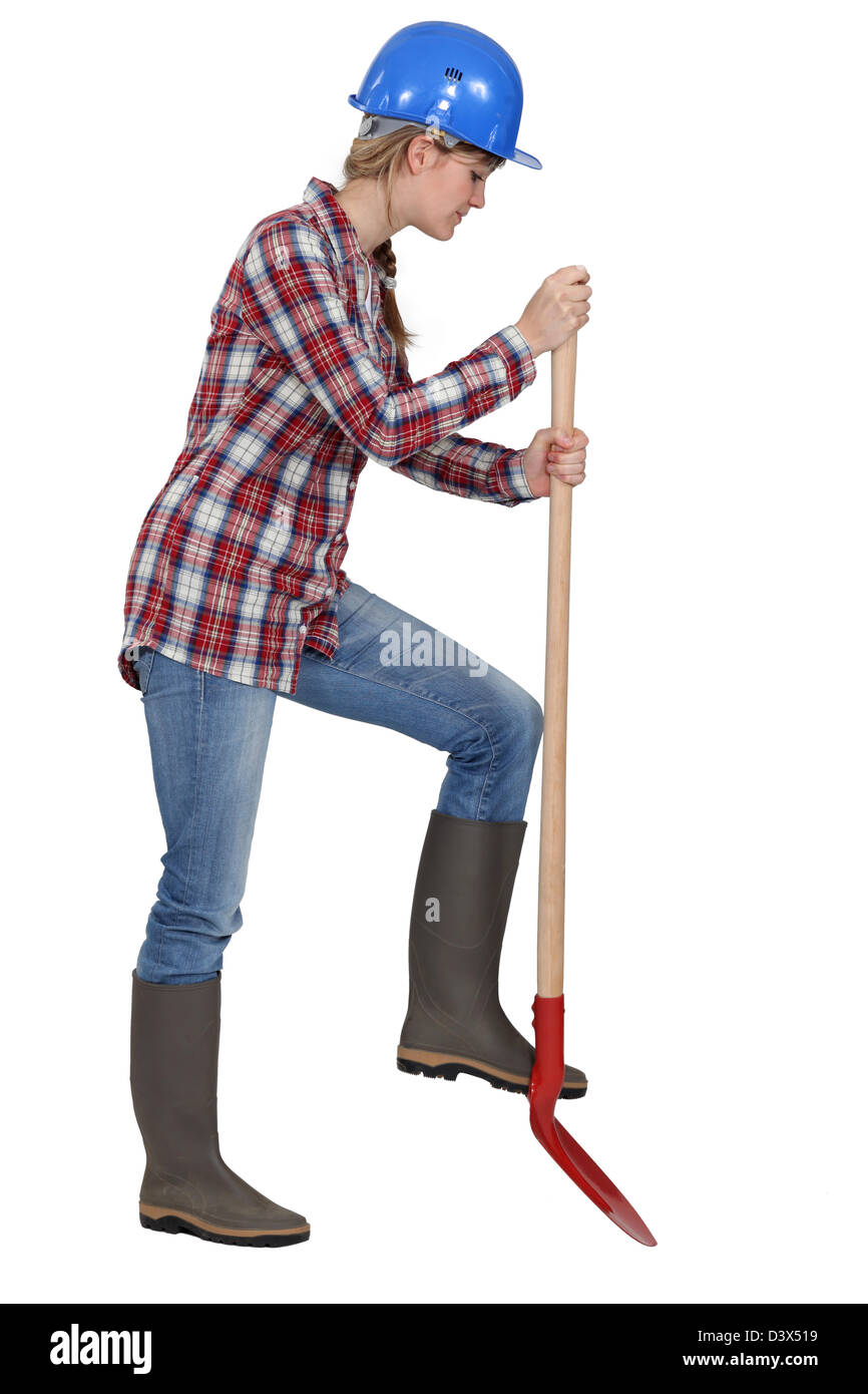 Woman digging road hi-res stock photography and images - Alamy