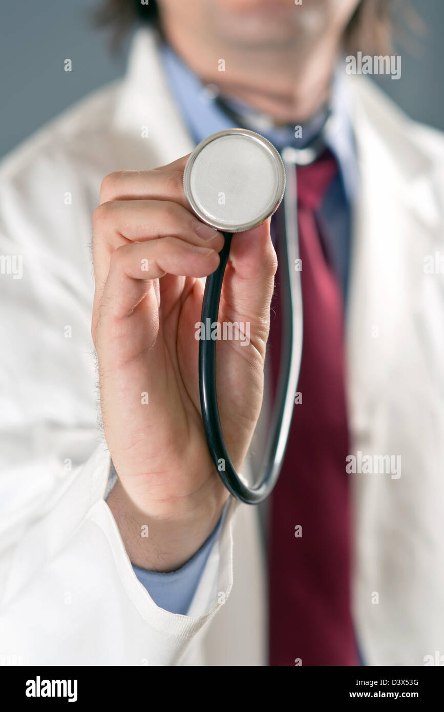 Male doctor with stethoscope, close up image with shallow depth of ...