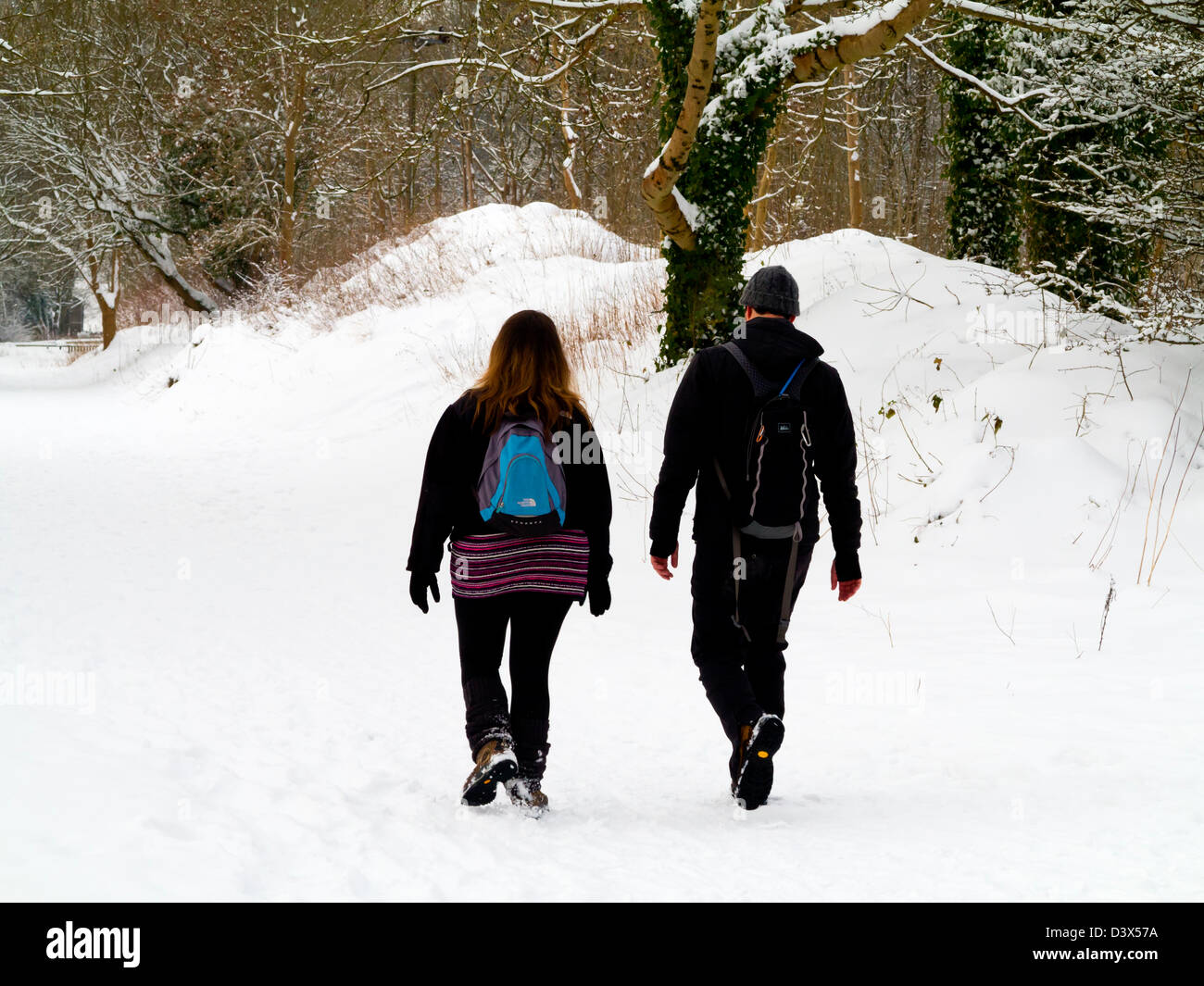 Couple enjoying winter walking in deep snow on the High Peak Trail near ...