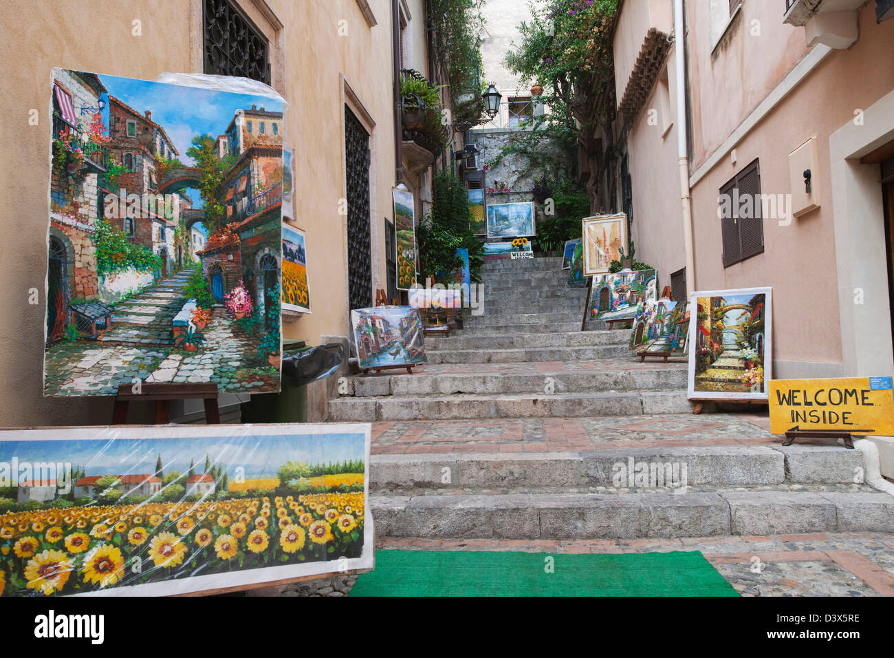 Display of paintings along the alley, Taormina, Province of Messina ...