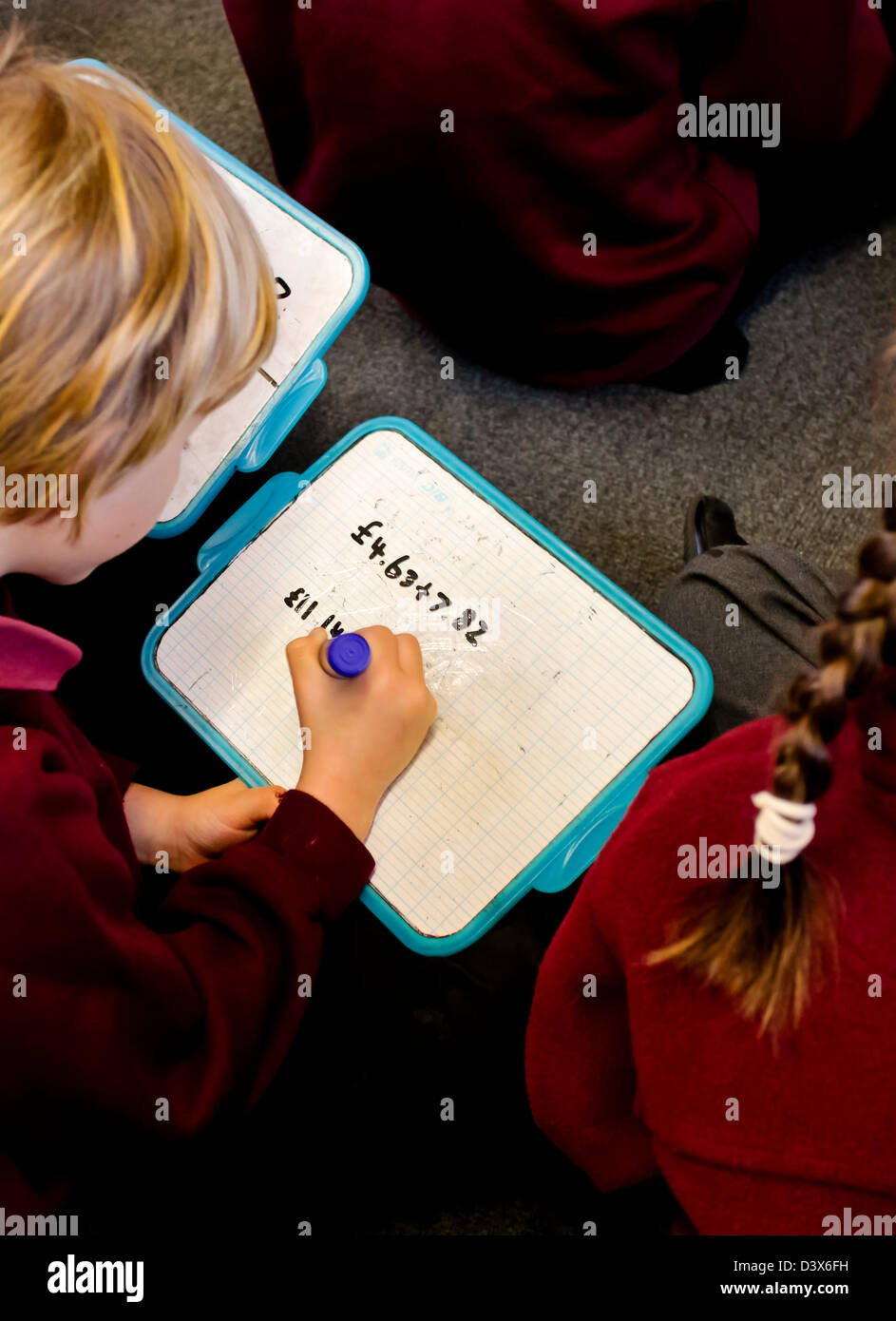 Child maths tablet hi-res stock photography and images - Alamy
