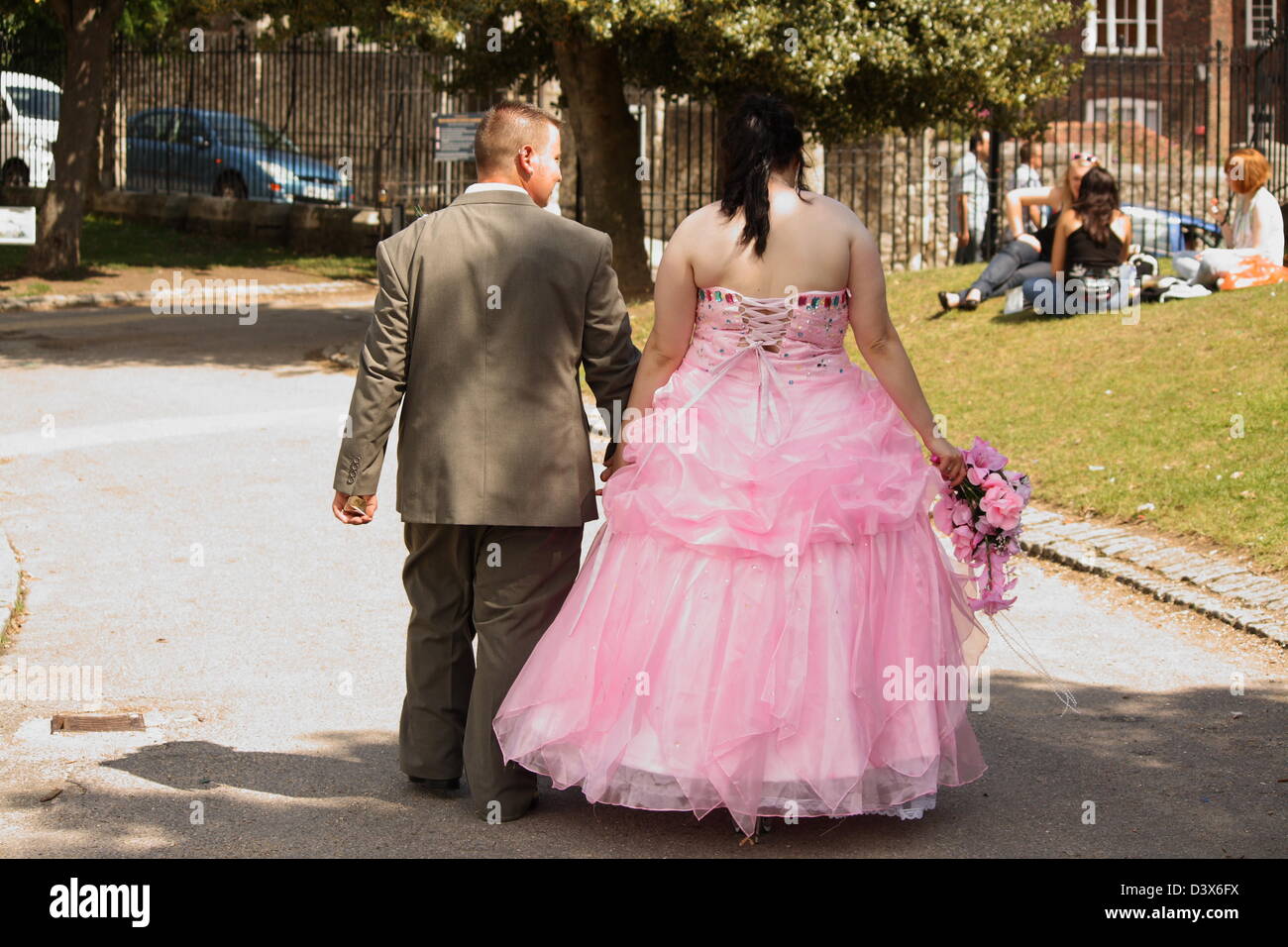 Bride and Groom walking together Stock Photo - Alamy