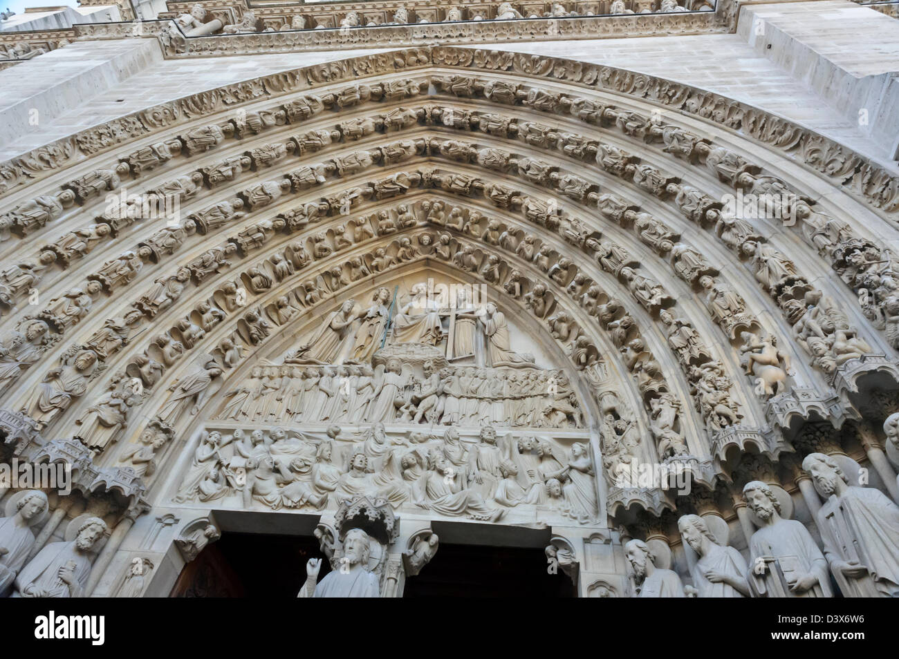 Bas relief figures at the entrance of Notre Dame Cathedral, Paris ...
