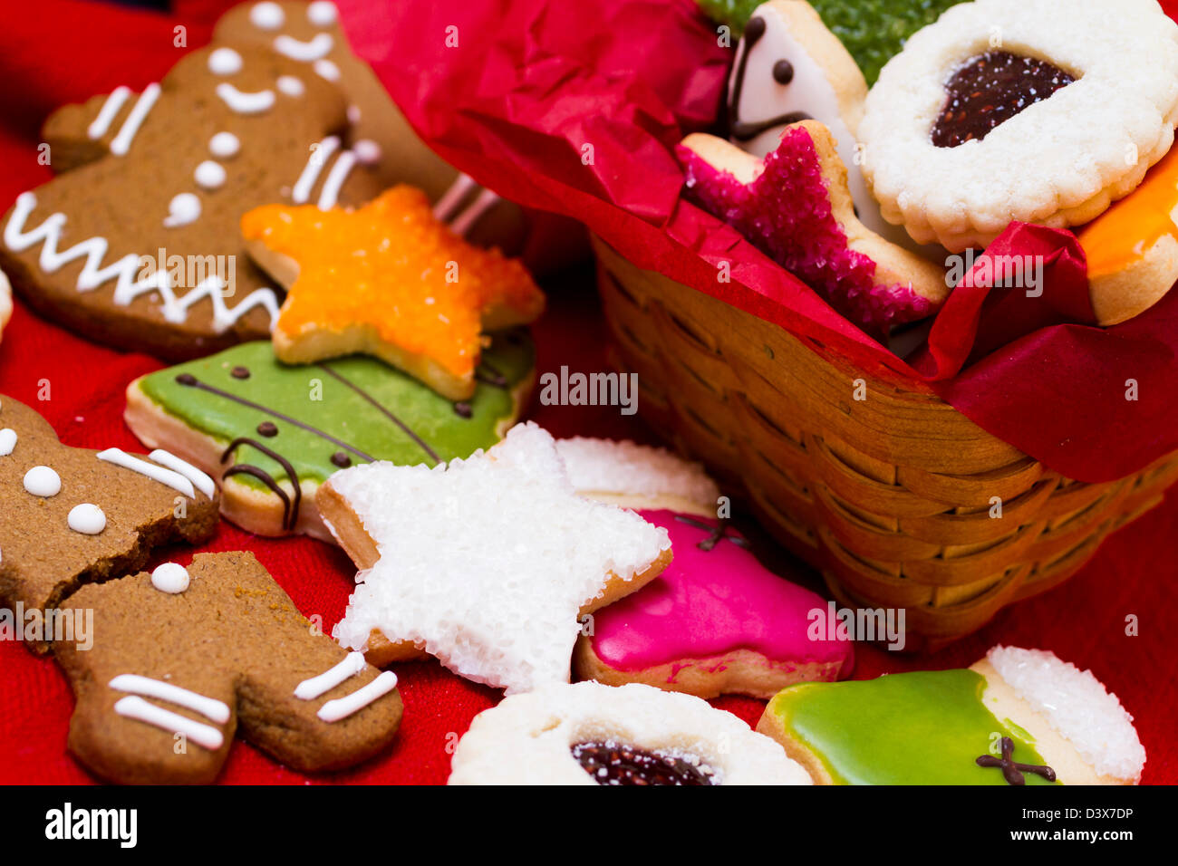 Assorted christmas cookies on red background Stock Photo - Alamy