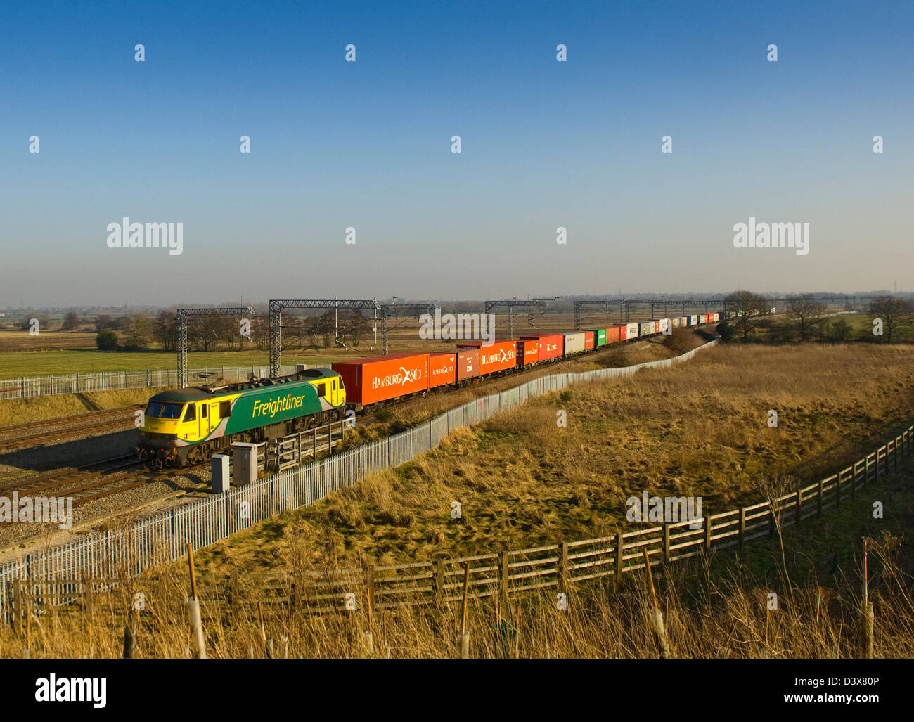 Class 90 045 heads north along the WCML at Hademore, Staffordshire with ...