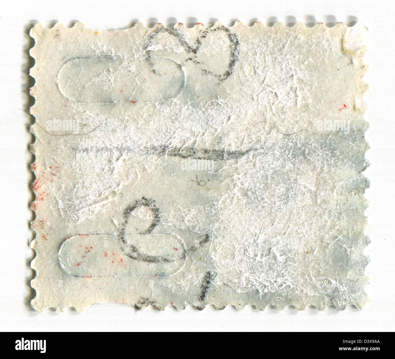 The reverse side of a postage stamp Stock Photo - Alamy