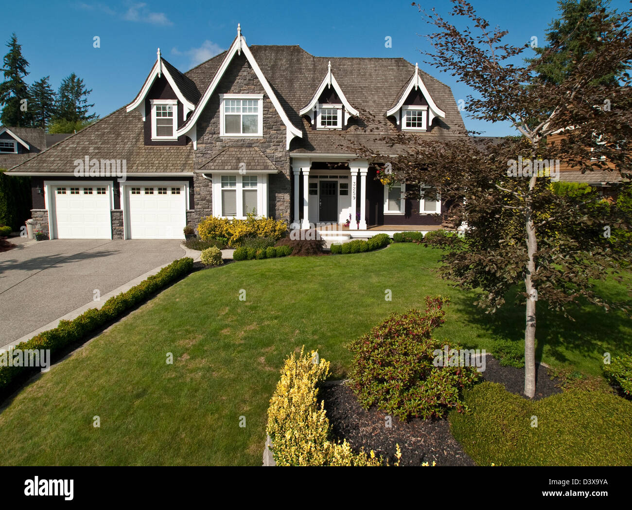 Gothic Style Home with Fancy Dormers Stock Photo - Alamy