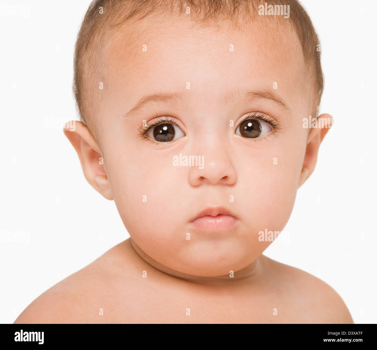 Close-up of a baby boy thinking Stock Photo - Alamy