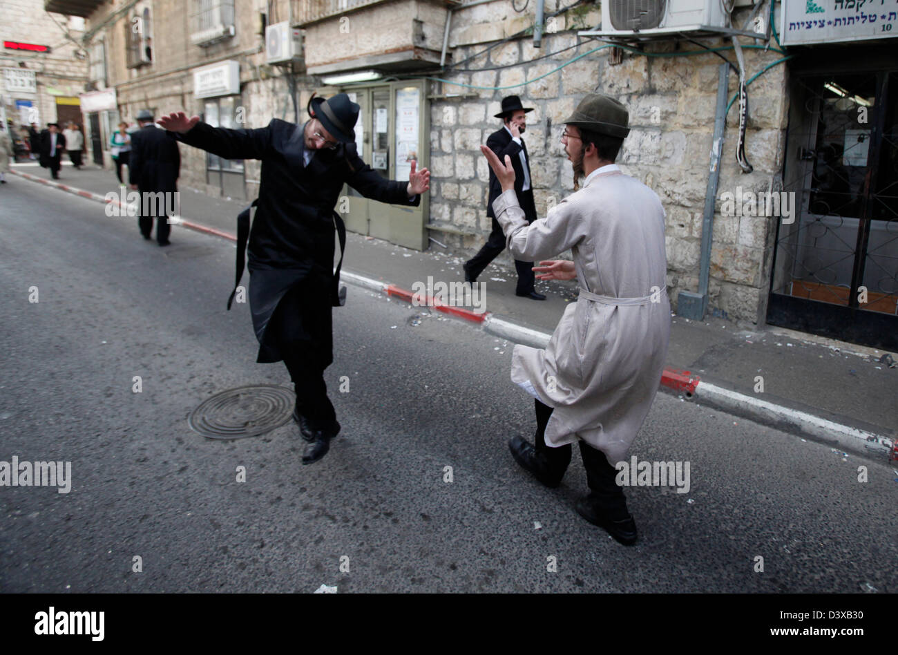 Drunk haredi Jews dancing in the street during the Jewish holiday of ...