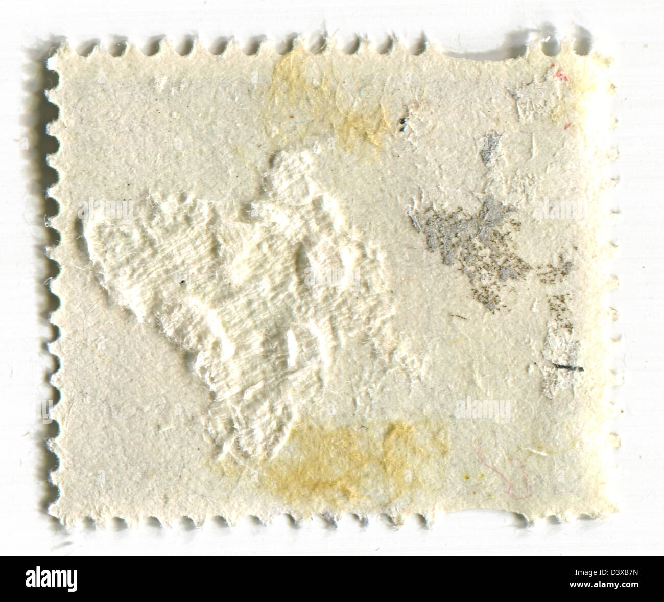 The reverse side of a postage stamp Stock Photo - Alamy