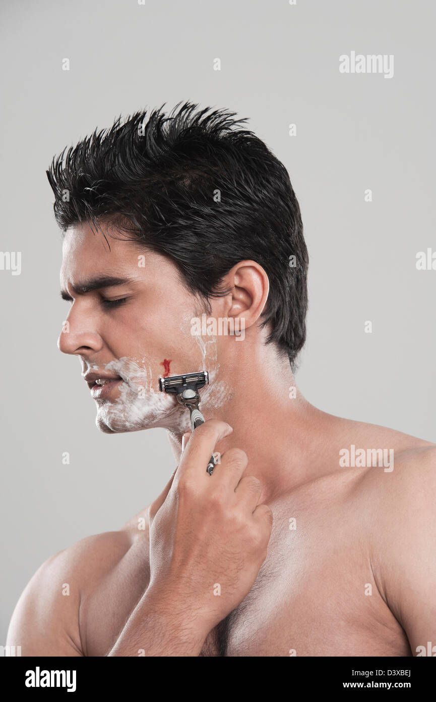 Man with shaving cut Stock Photo - Alamy